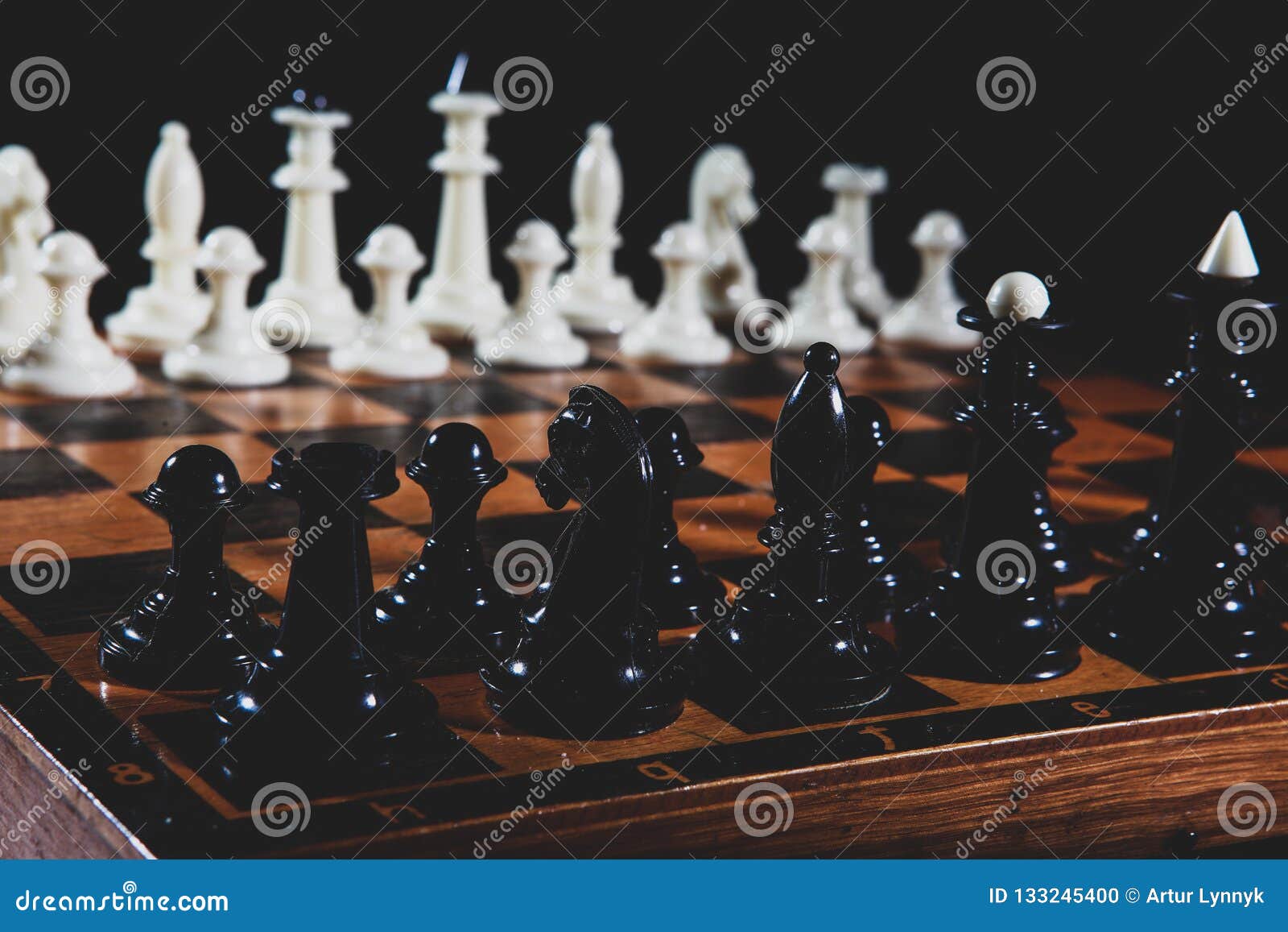 Chess pieces on the table stock photo. Image of arrangements - 133245400