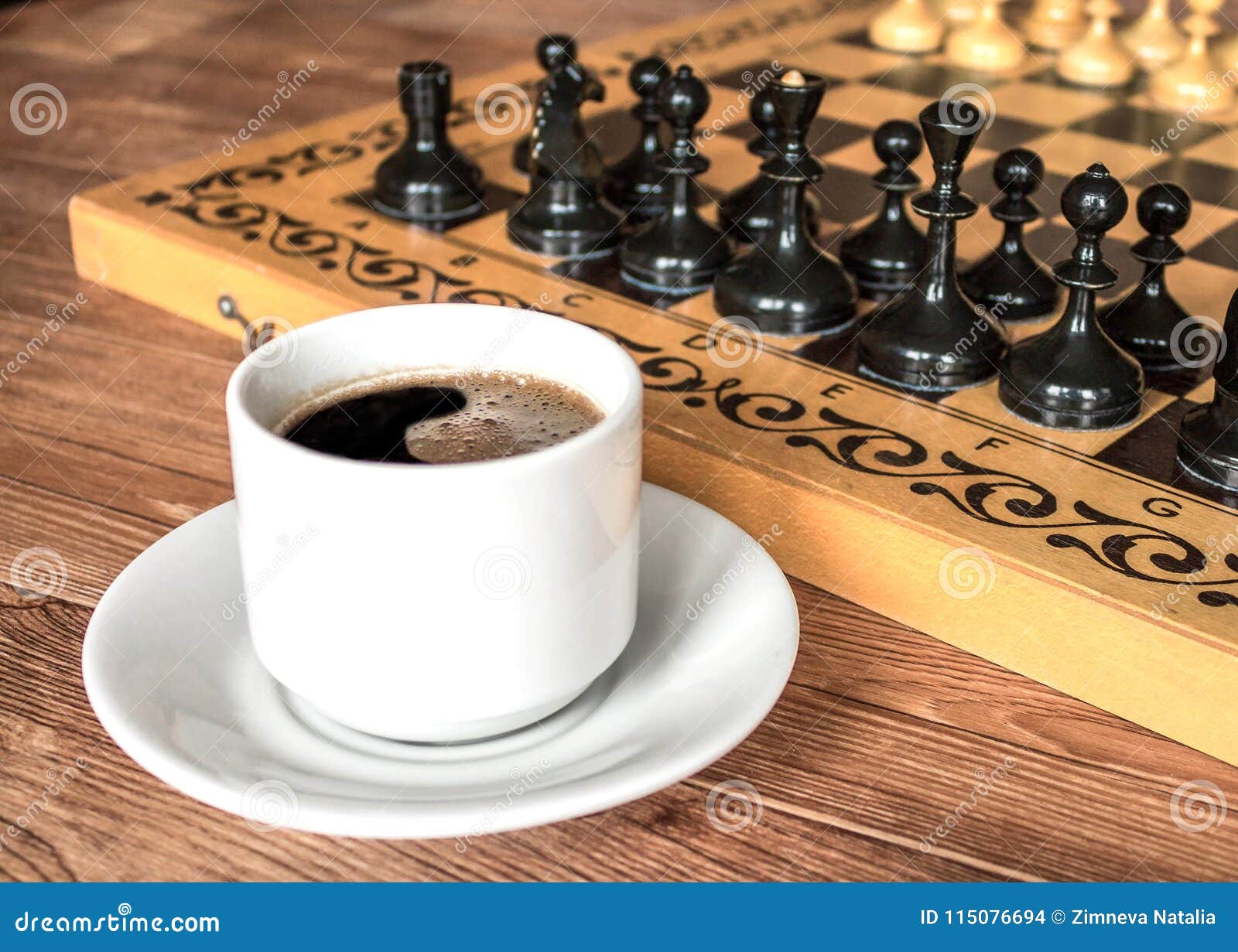 Chess Pieces on the Table and a Cup of Coffee Stock Photo - Image of ...