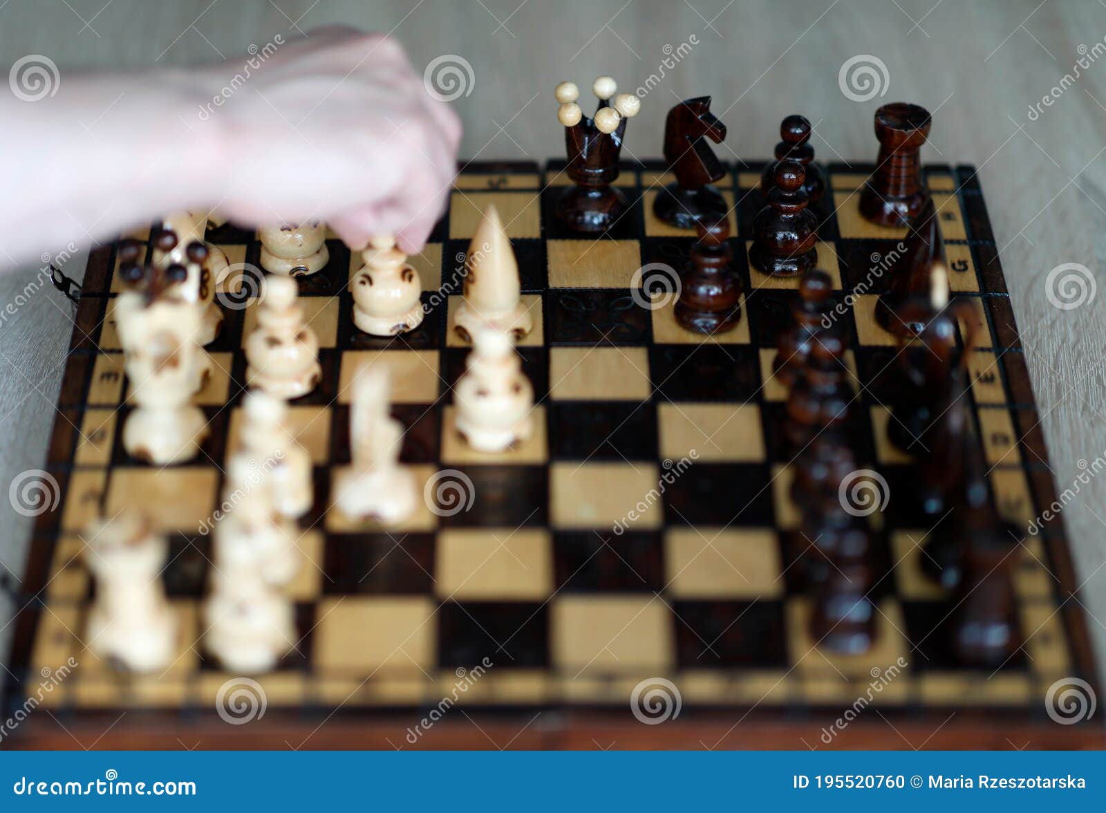 Chess player`s hand. stock photo. Image of competition - 195520760