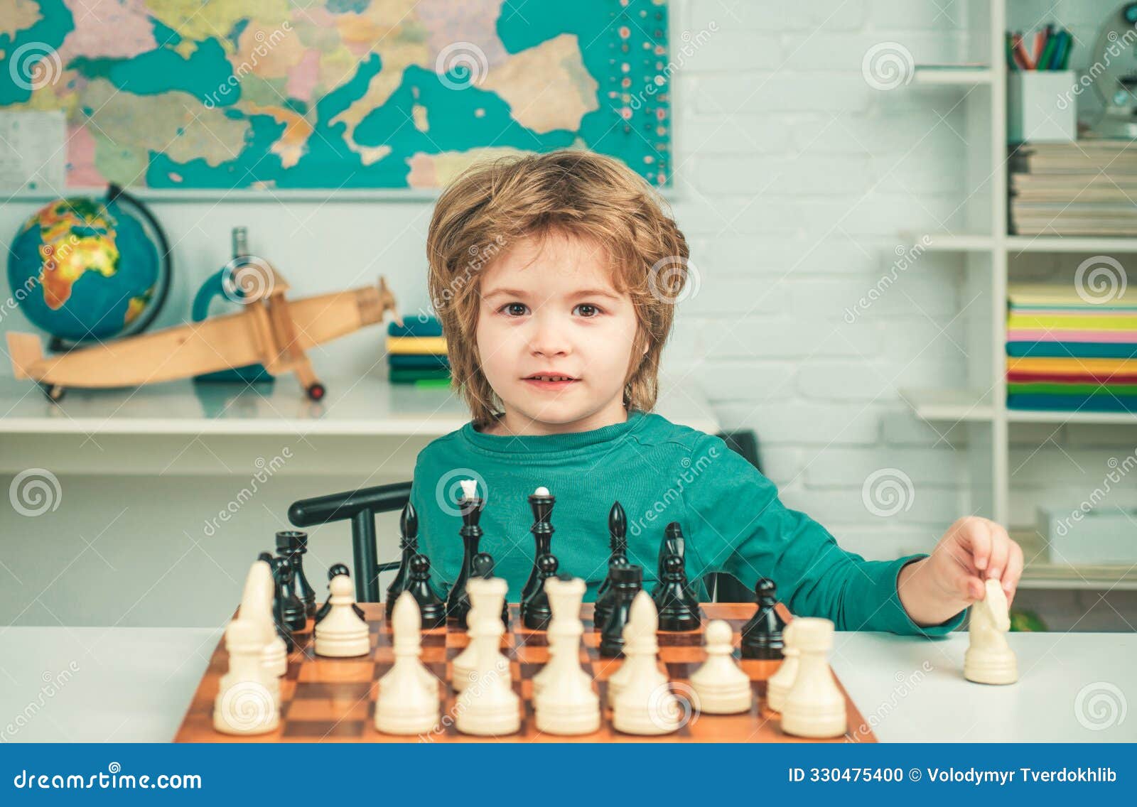 Chess School. Clever Concentrated And Thinking Kid Playing Chess. Kids ...
