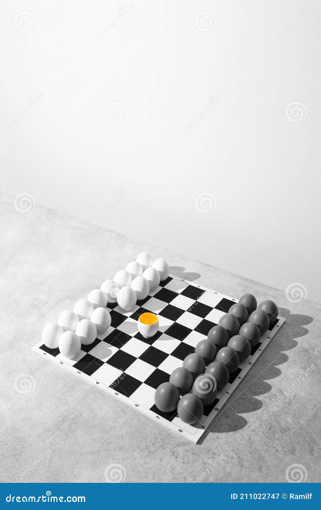 Chessboard with Figures of White and Brown Eggs on a Grey Background ...
