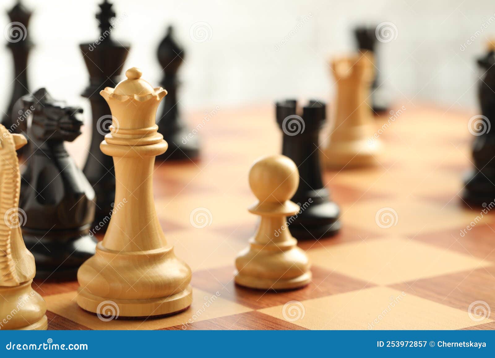 Chessboard with Game Pieces on Light Background, Closeup Stock Image ...