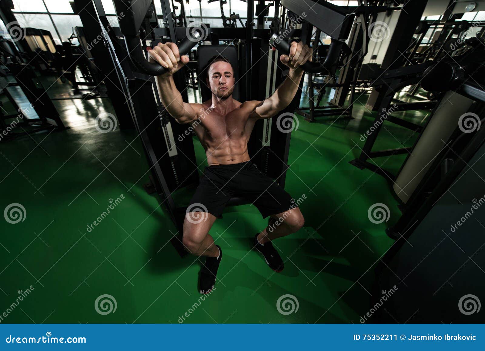 Chest Exercise in a Gym stock image. Image of aerobics - 75352211