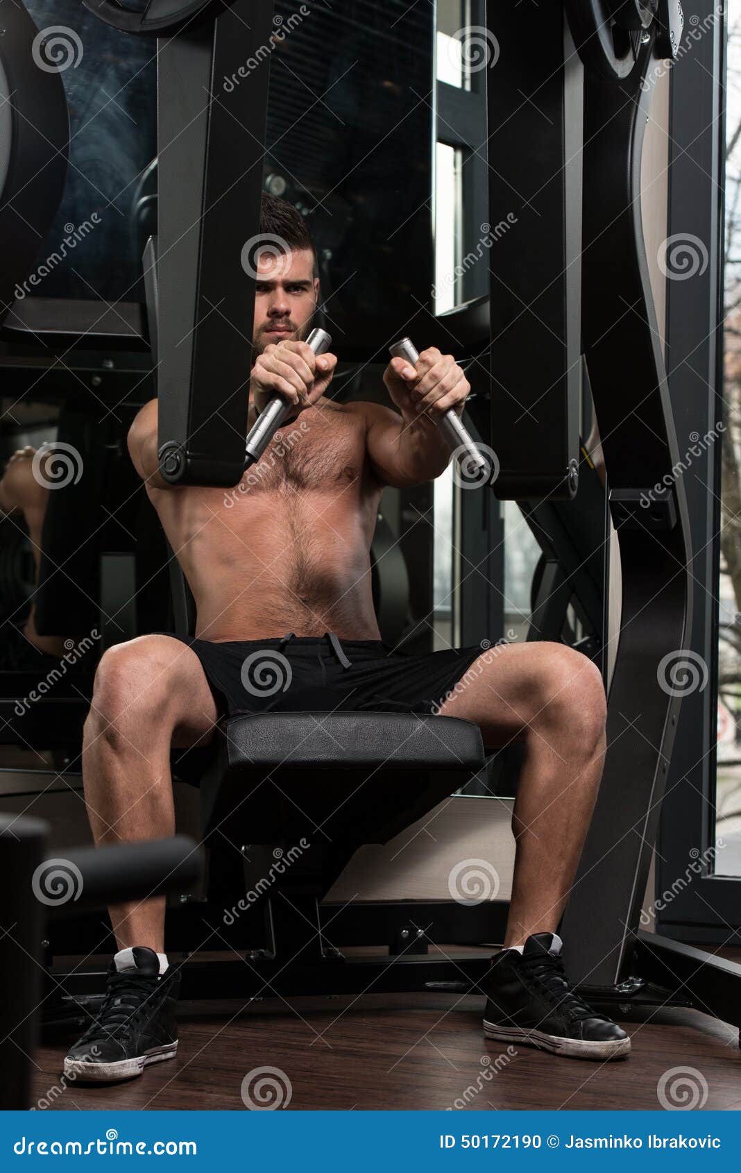 Chest Exercise on Machine stock photo. Image of activity - 50172190
