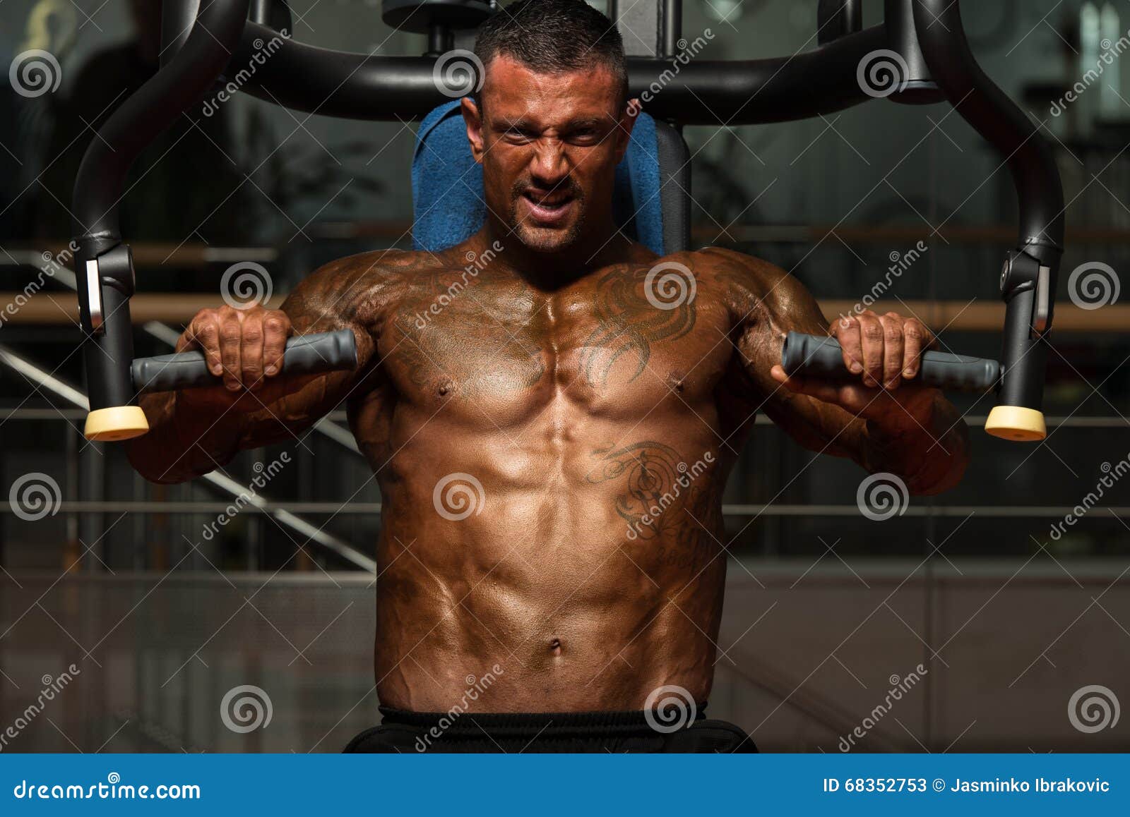 Chest Exercises on a Machine Stock Image - Image of picking, athlete ...