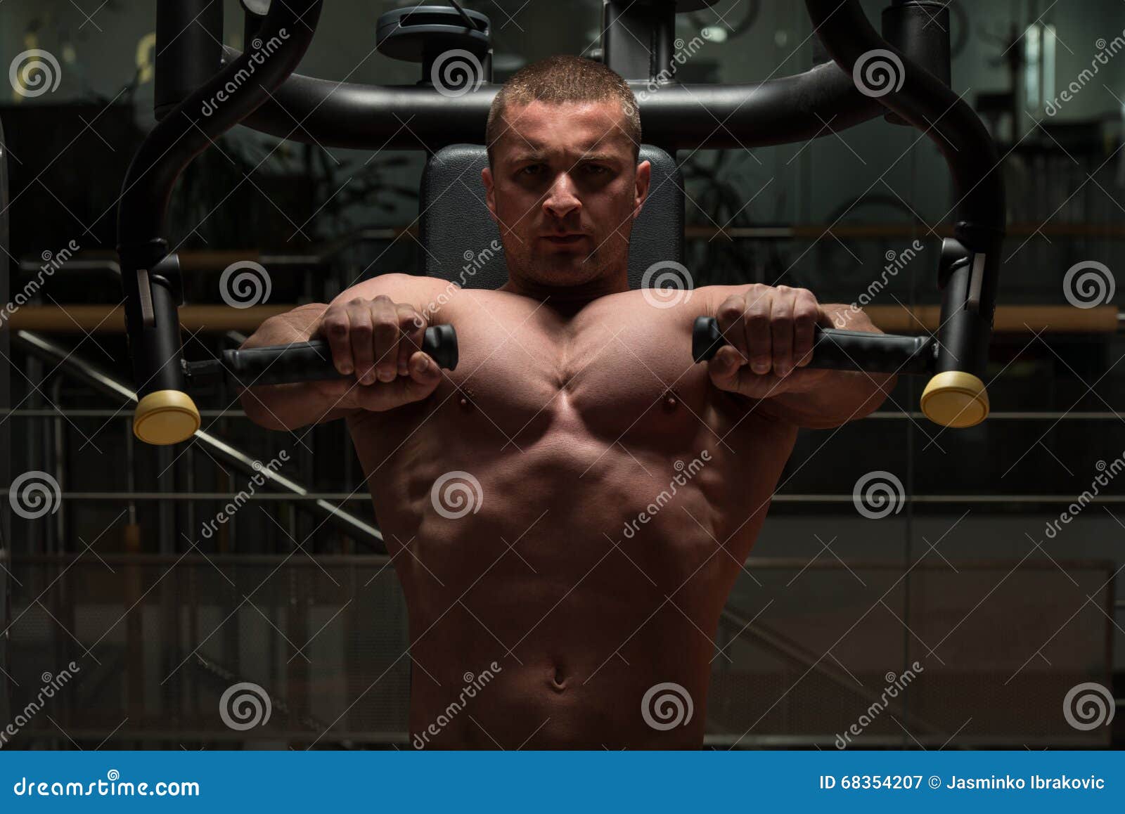 Chest Exercises on a Machine Stock Image - Image of aerobics, human ...