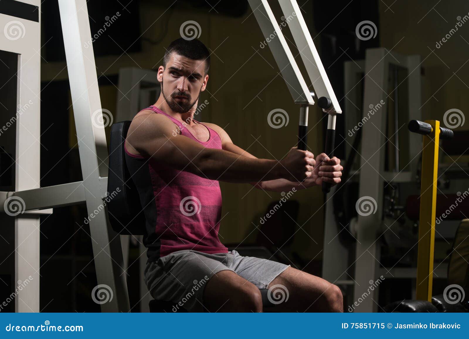 Chest Exercises on a Machine Stock Image - Image of exercising, picking ...