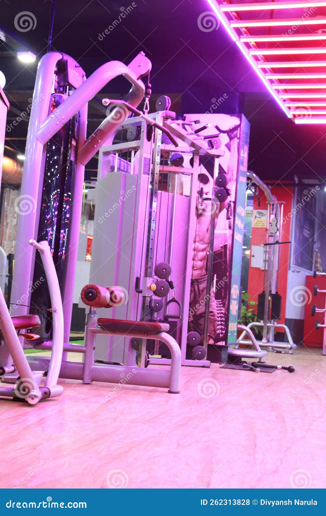 A Chest Press Machine with Red Lighting Stock Photo - Image of light ...