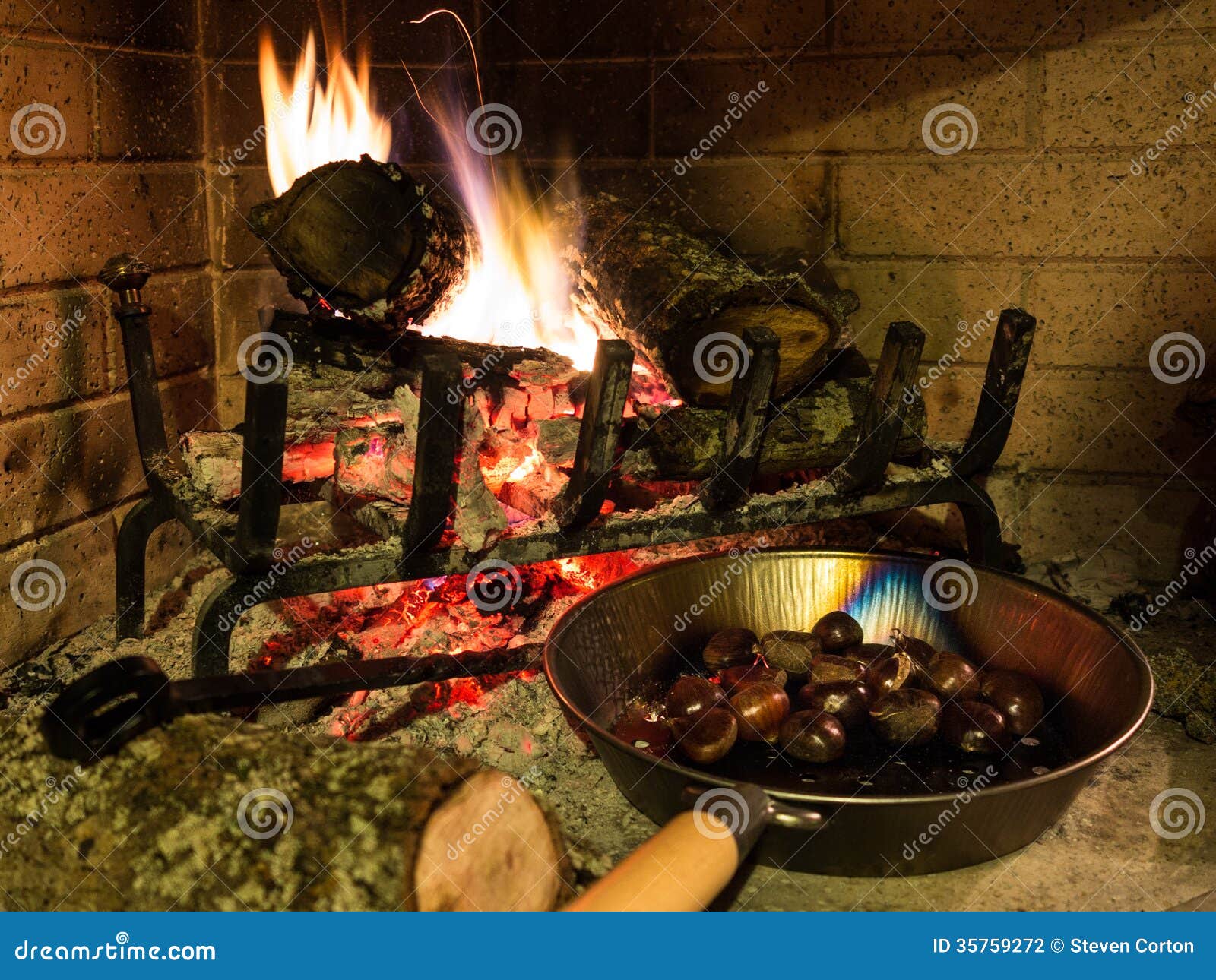 Chestnuts on an open fire stock photo. Image of hearth - 35759272