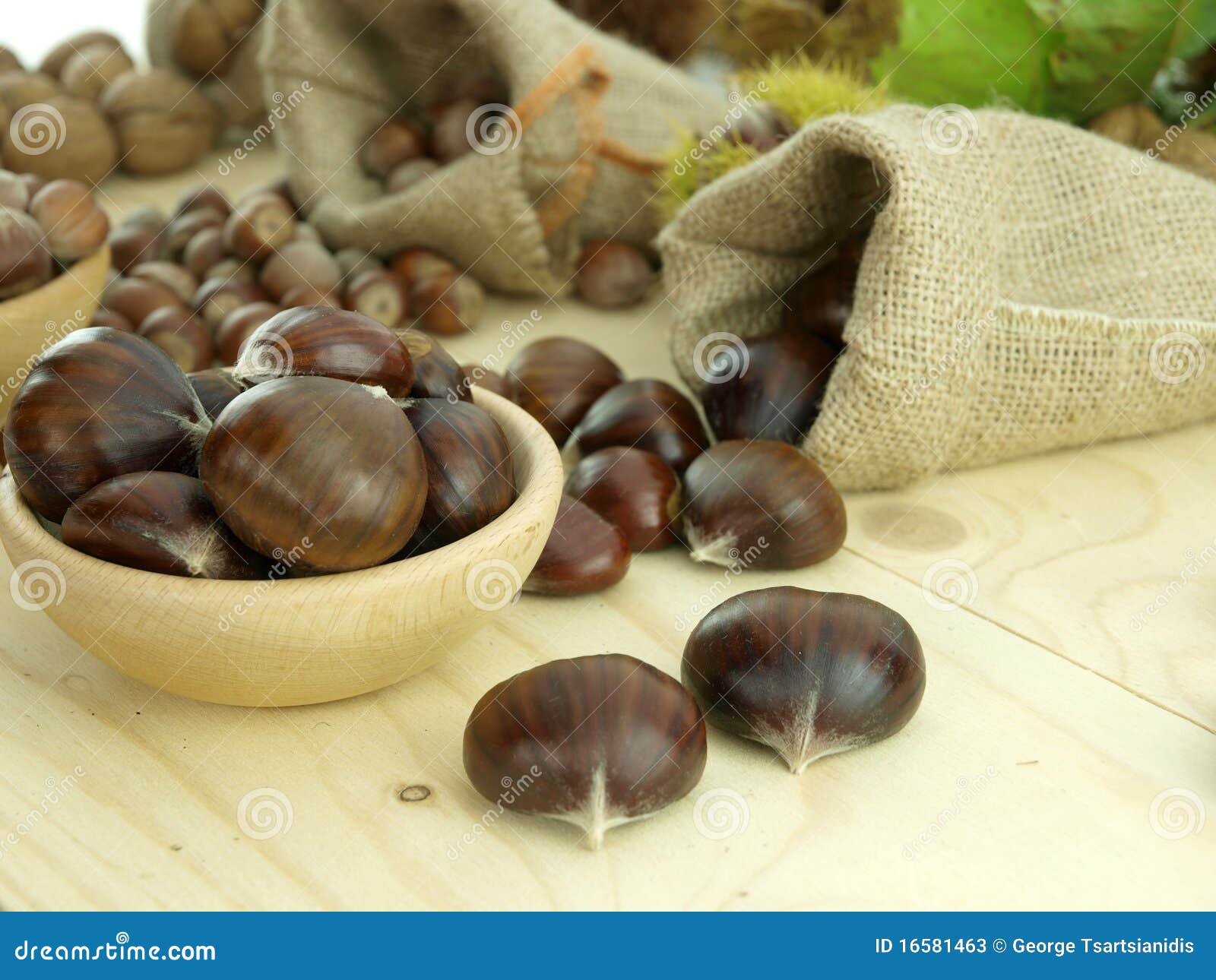 Chestnuts and walnuts stock image. Image of october, hazelnut - 16581463