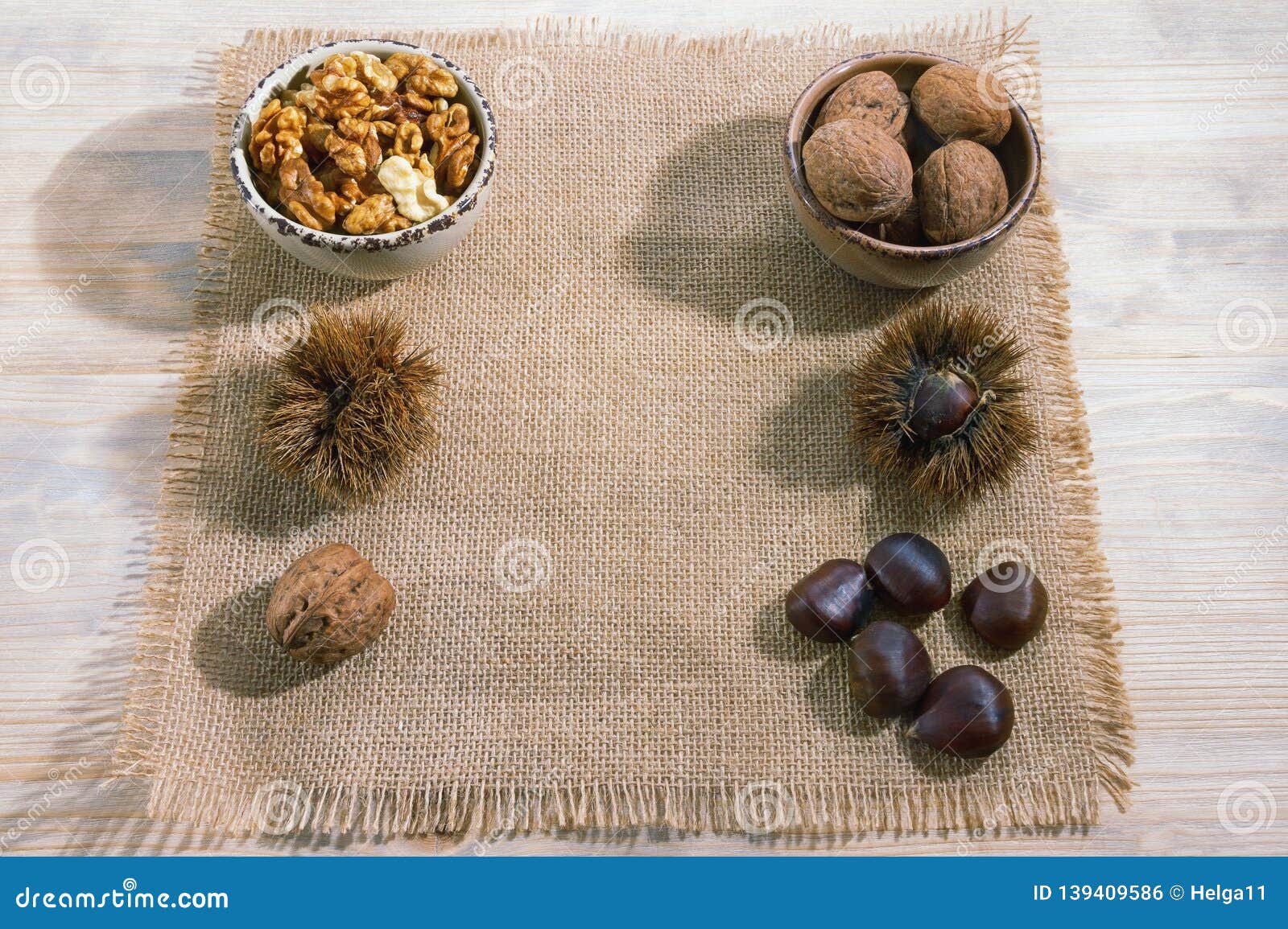 Chestnuts and Walnuts on Rustic Background Stock Photo - Image of ...