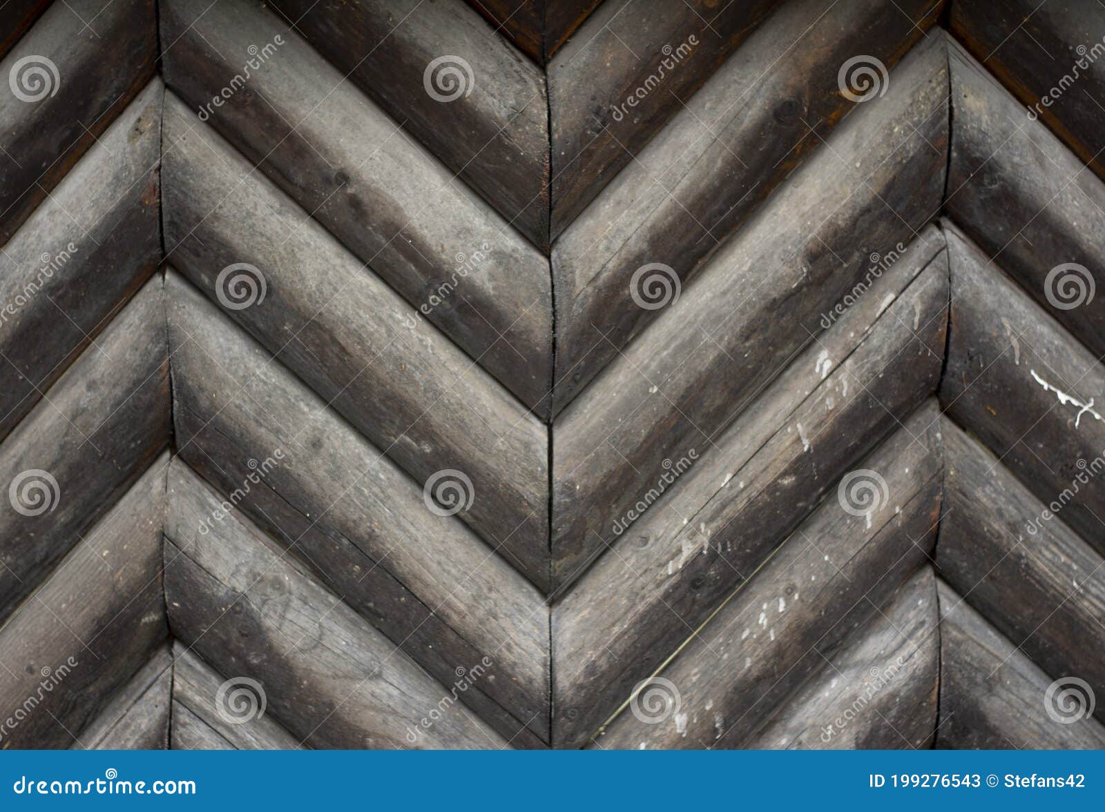 Close View of Chevron Pattern Wooden Logs. Chevron Pattern Log Fence ...