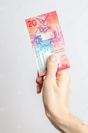 20 CHF Banknote Held in Hand Stock Photo - Image of rich, economy ...