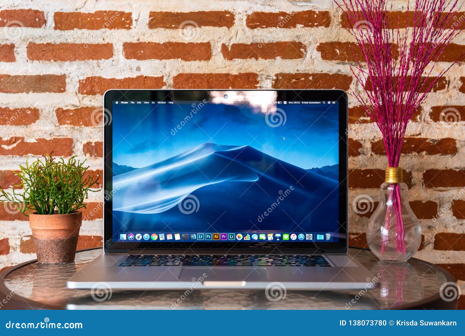 Macbook computers on table editorial image. Image of concrete - 138073780