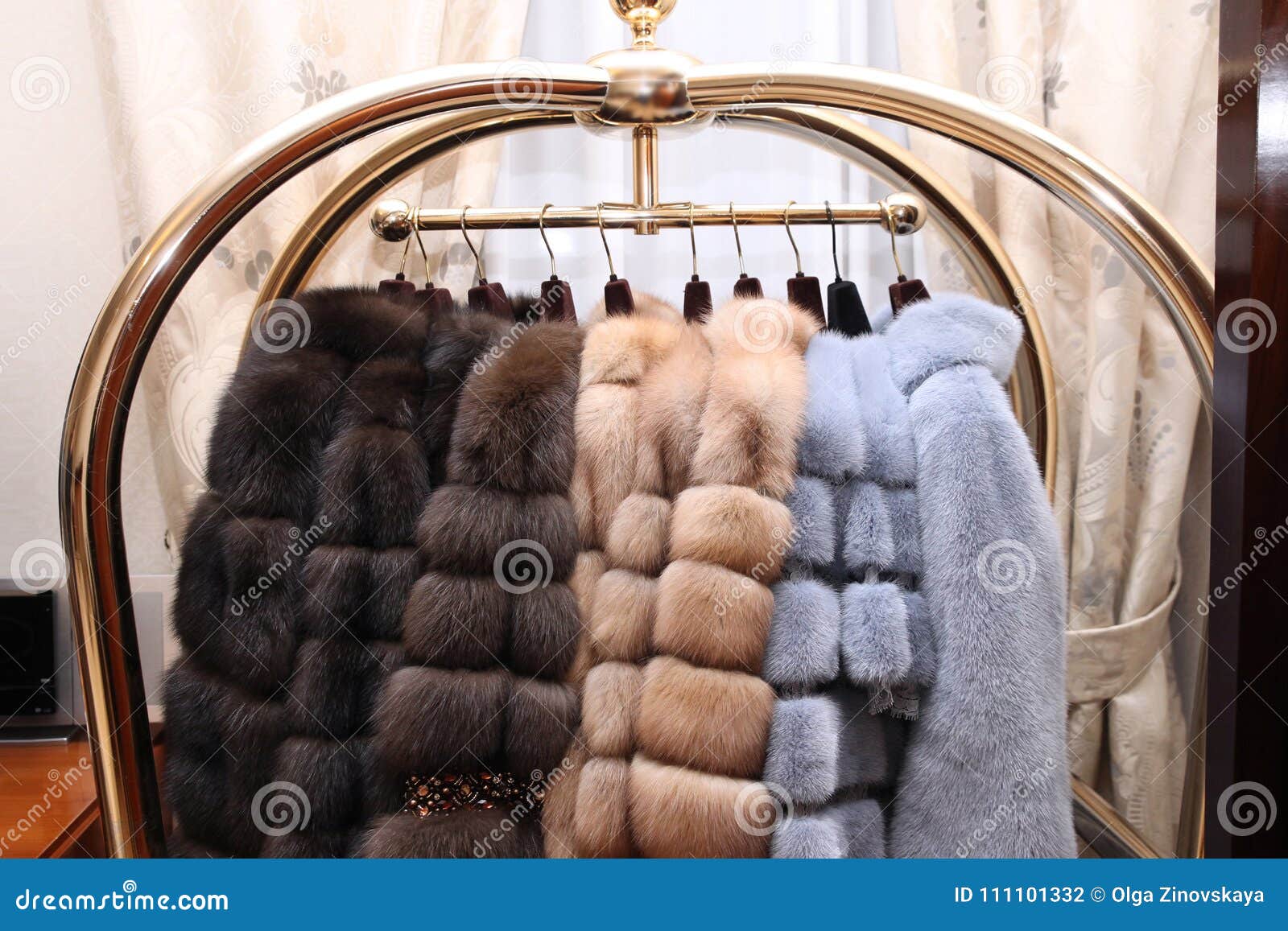 Chic expensive fur coats stock photo. Image of hanger - 111101332