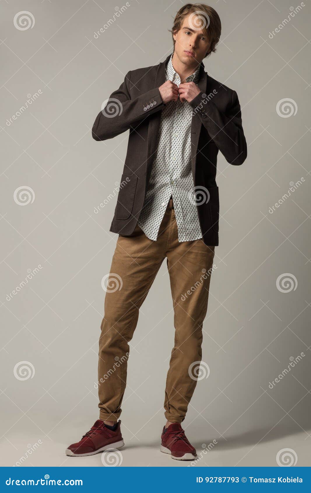Chic Man in White Skirt and Brown Jacket and Trousers. Stock Image ...