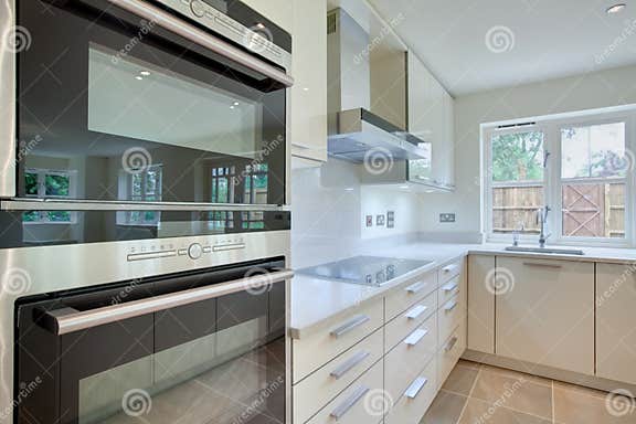 Chic modern kitchen stock image. Image of grill, cupboard - 15498945