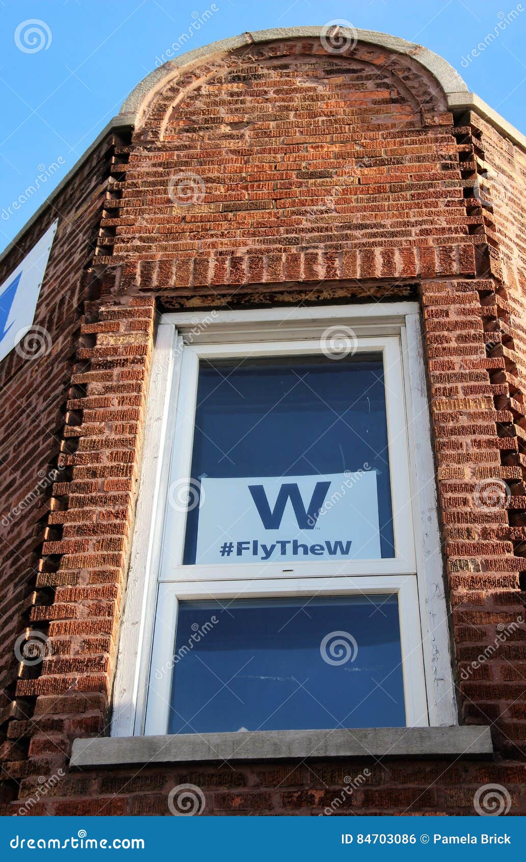 Chicago Cubs Fly the W Sign in a Window Editorial Photo - Image of team ...