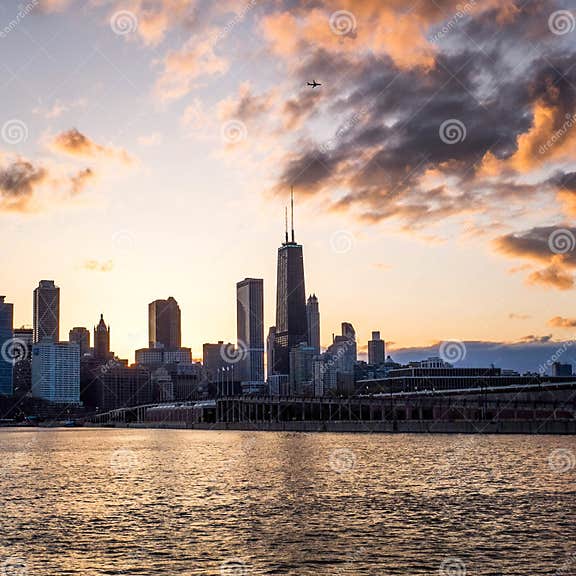 Chicago skyline at sunset editorial photo. Image of pier - 53529446