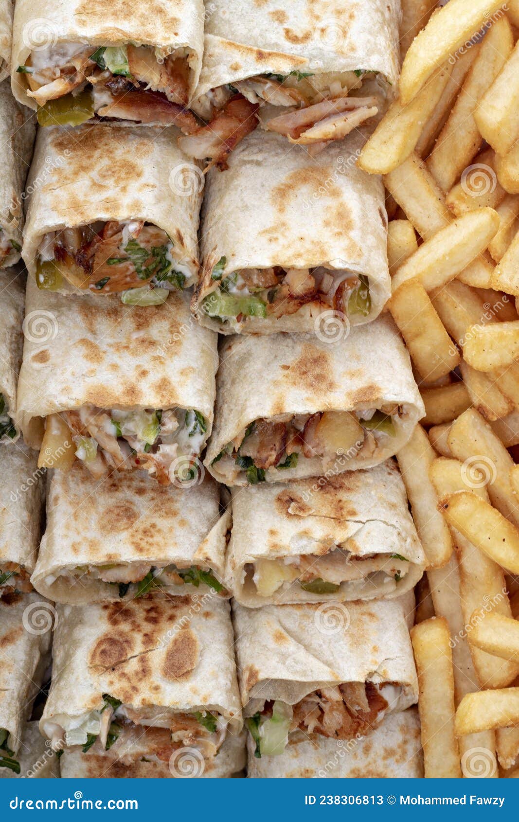 Chicken Arabic Shawarma Styled with Sliced Potatoes.- Image Stock Image ...