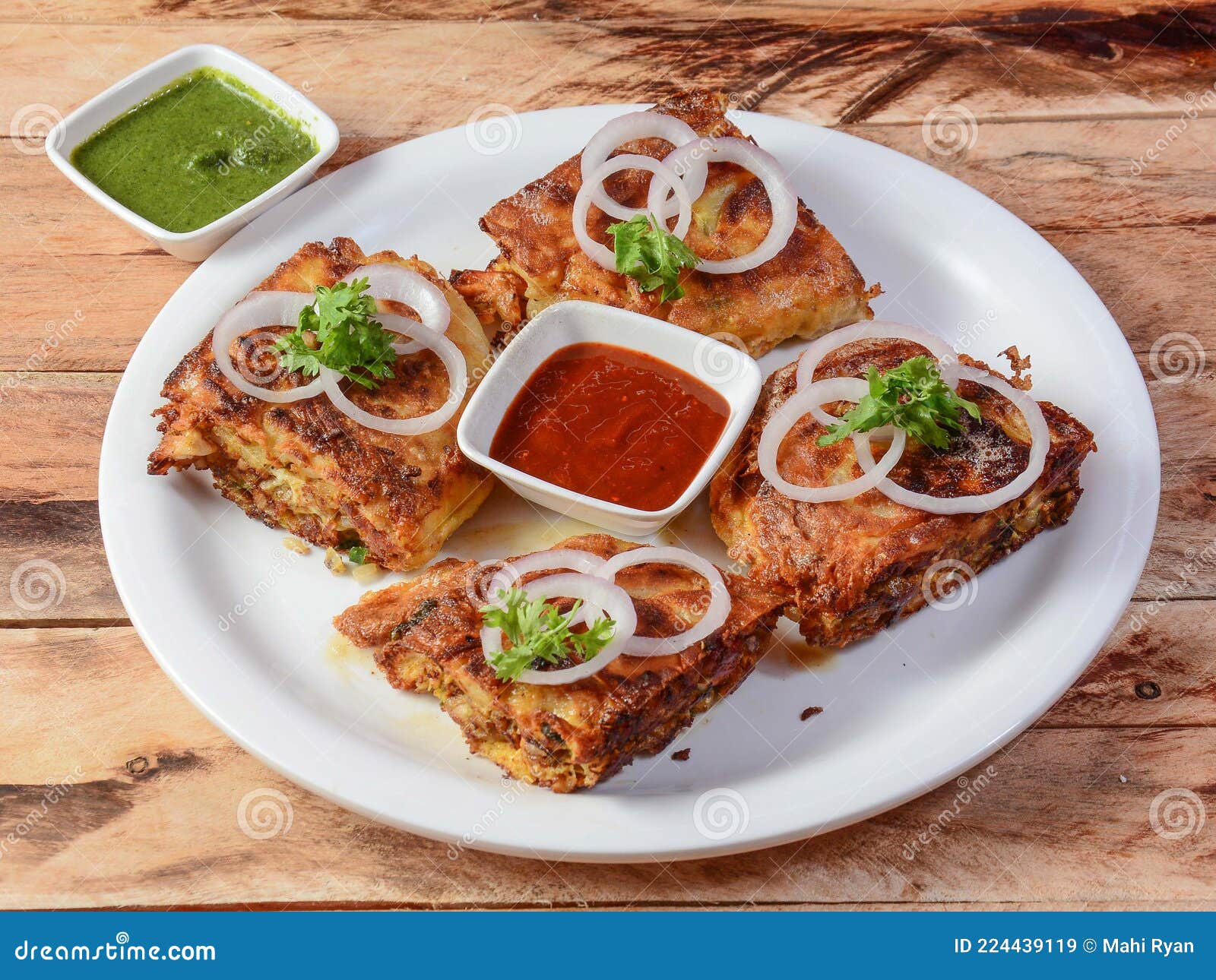 Chicken Baida Roti, Isolated Over a Rustic Wooden Background, Selective ...