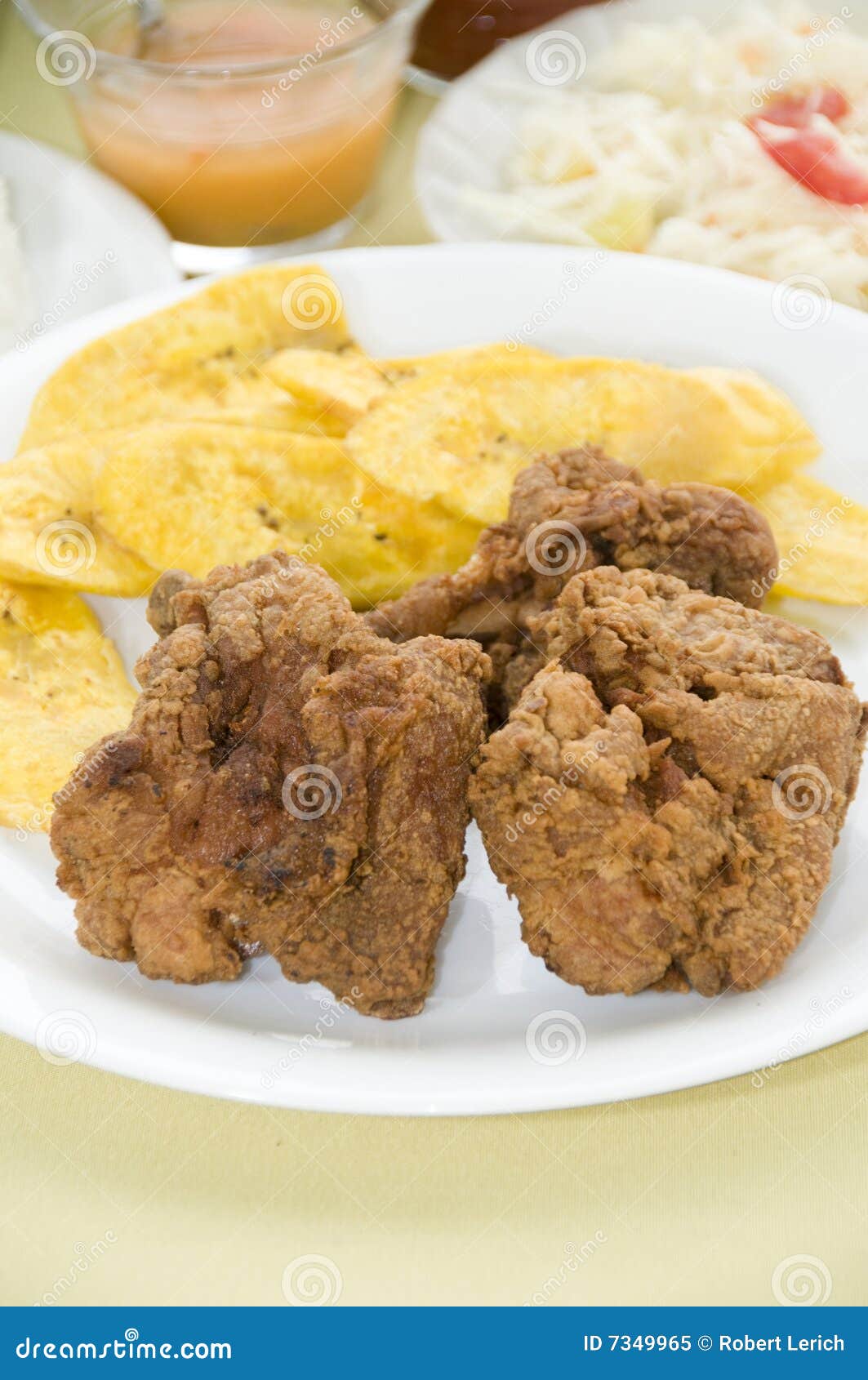 Chicken bocas and tostones stock image. Image of sauce - 7349965