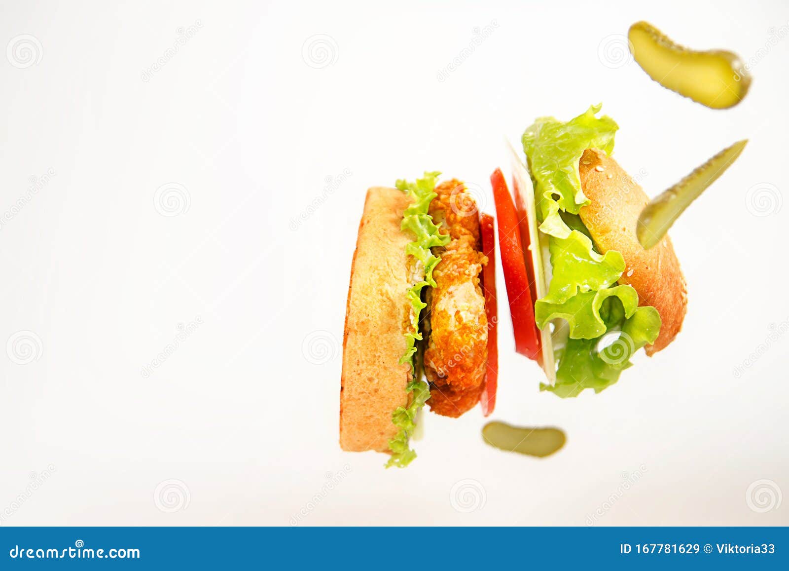 Chicken Burger Flying in the Air on Light Background Stock Image ...