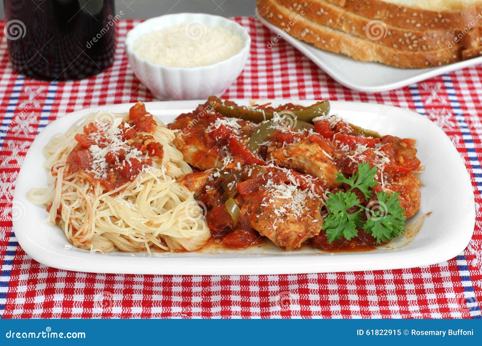 Chicken Cacciatore with Pasta and a Side of Bread. Stock Image - Image ...