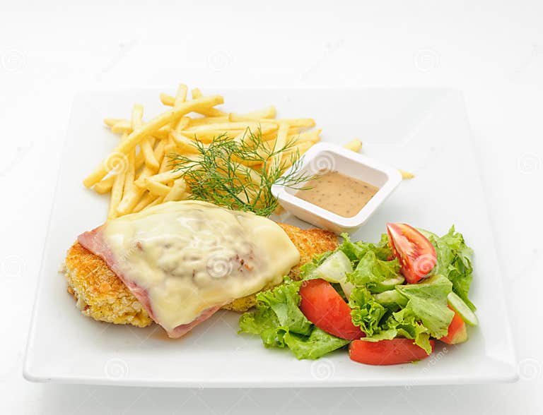 Chicken Cutlet with Ham and Cheese Stock Photo - Image of crispy, loaf ...
