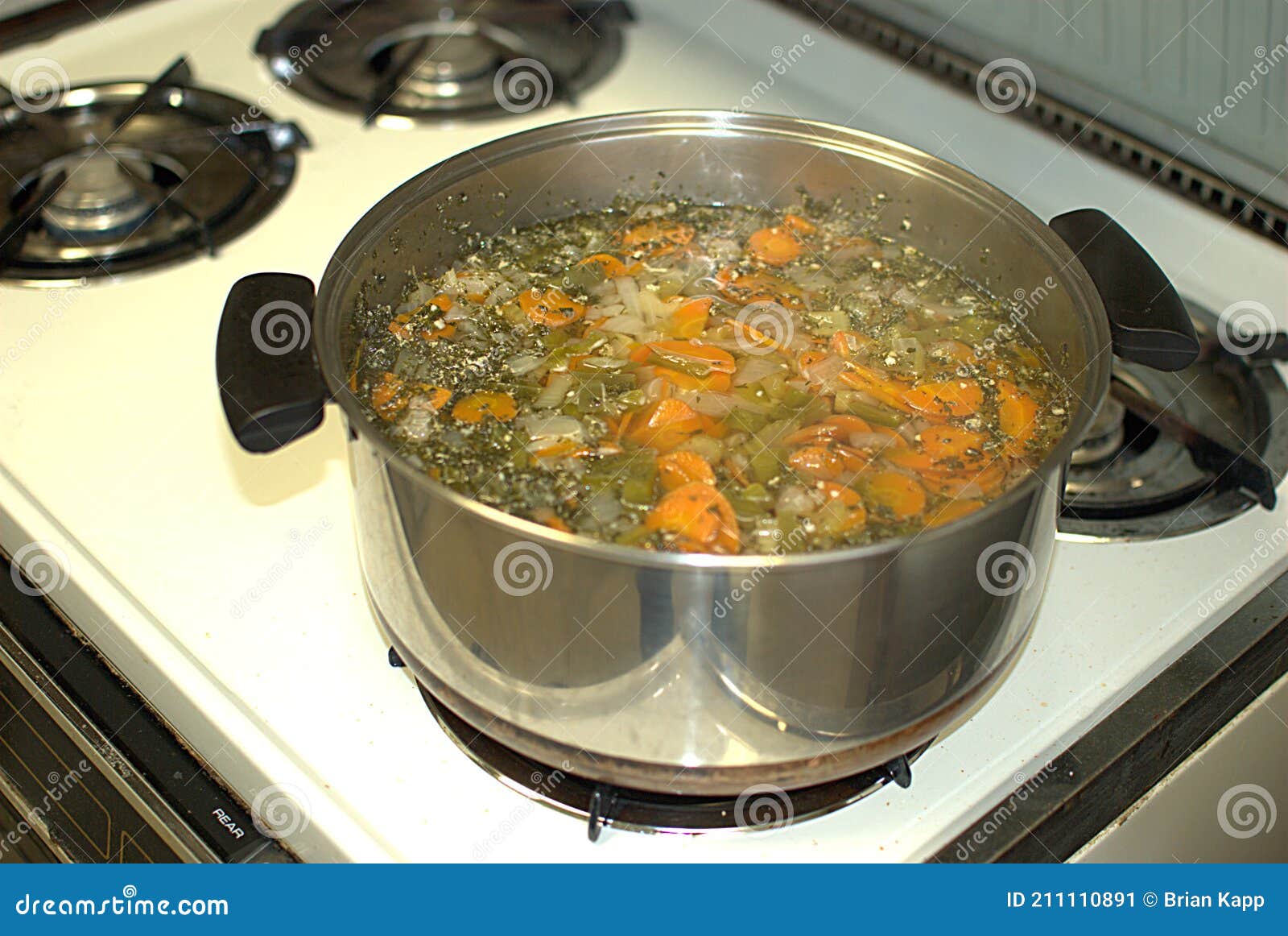 A Chicken and Dumplings Meal in the Process of Simmering Stock Image ...