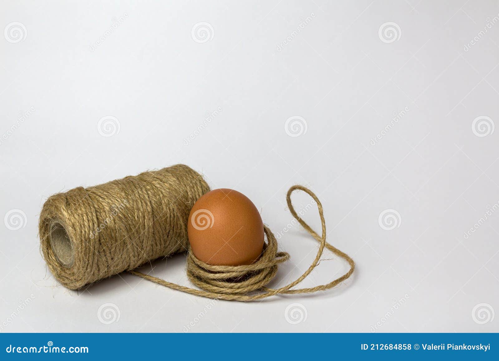Chicken Egg in Decorative Thread on a White Background, Isolated Stock ...