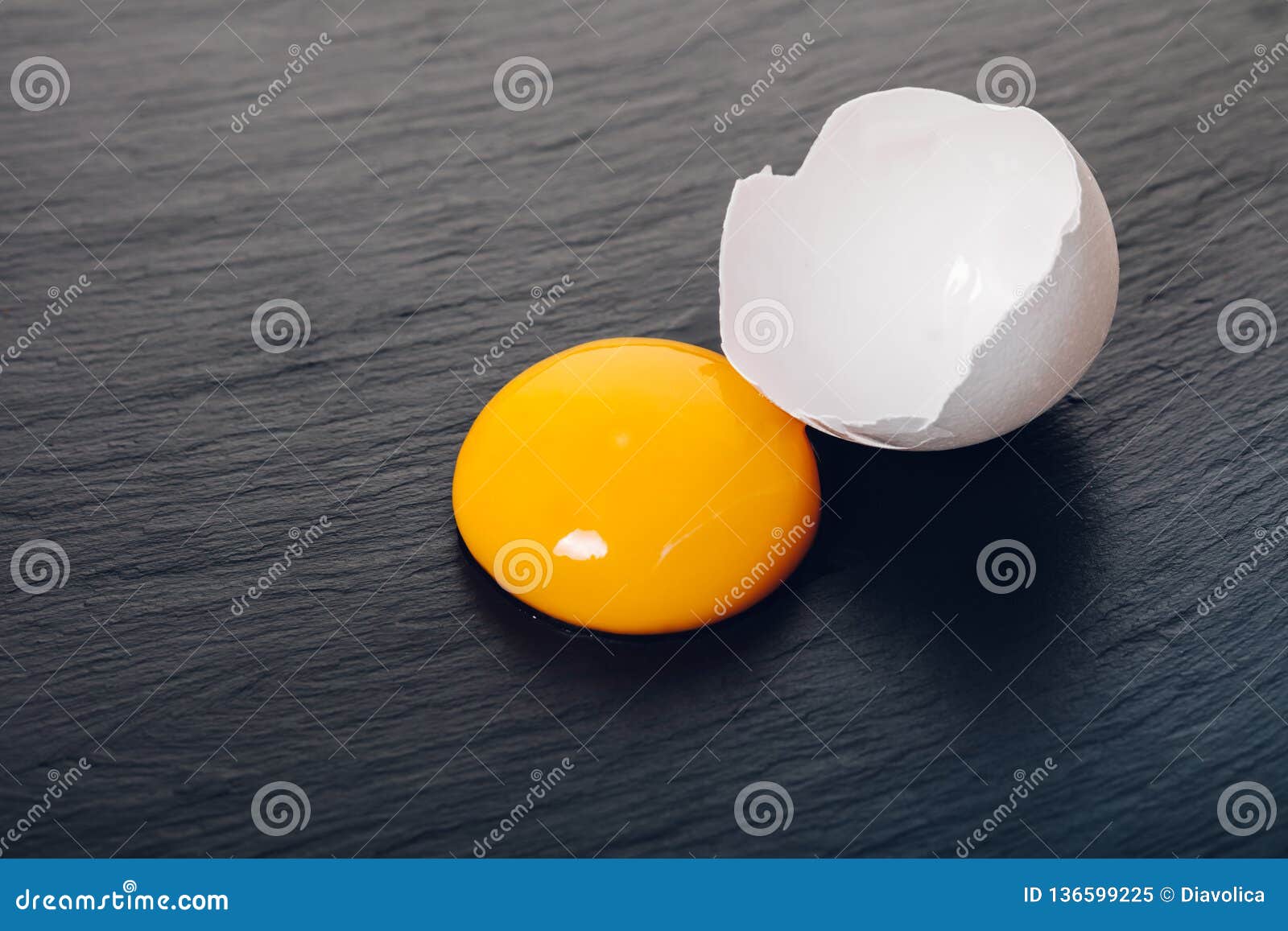 Chicken egg yolk closeup stock image. Image of food - 136599225