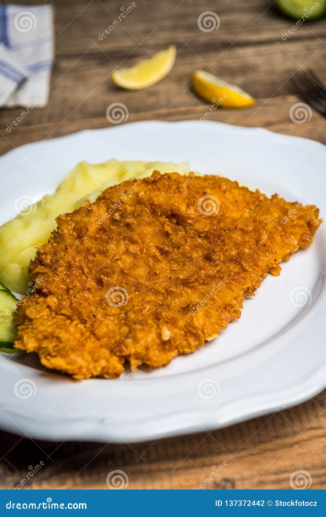 Chicken fried schnitzel stock photo. Image of lemon - 137372442