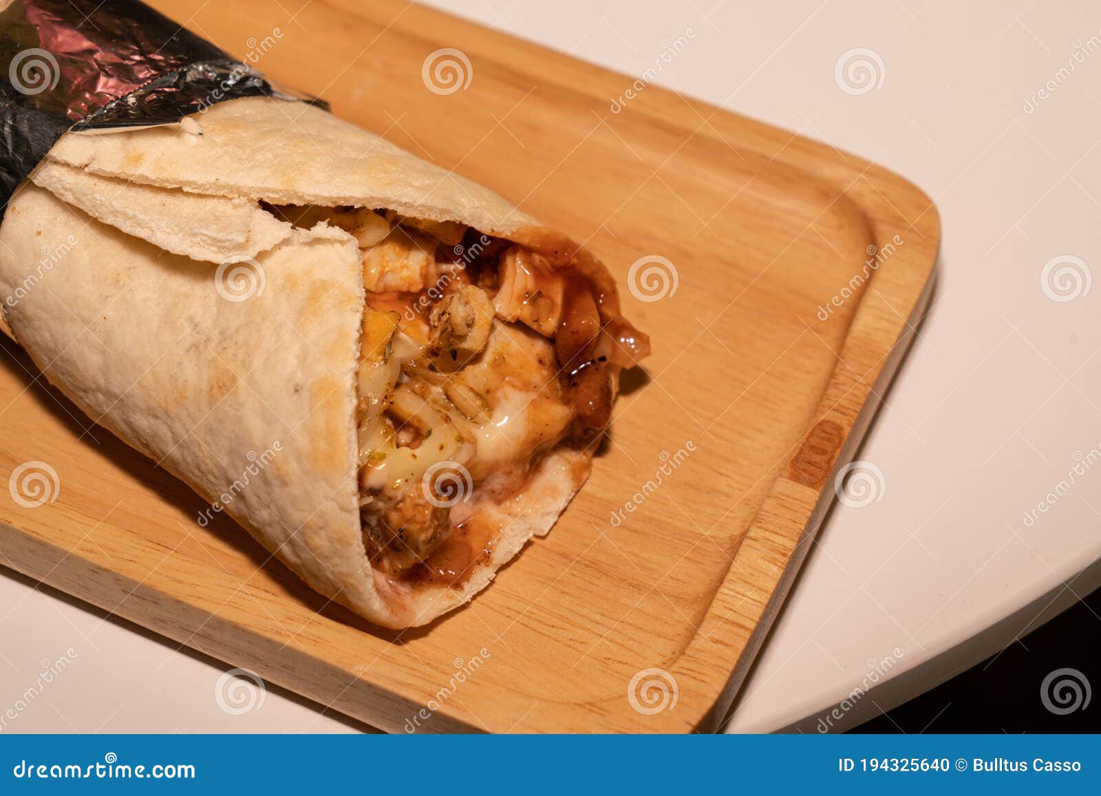 Chicken Kebab Roll on Wooden Plate Stock Photo - Image of table, tomato ...