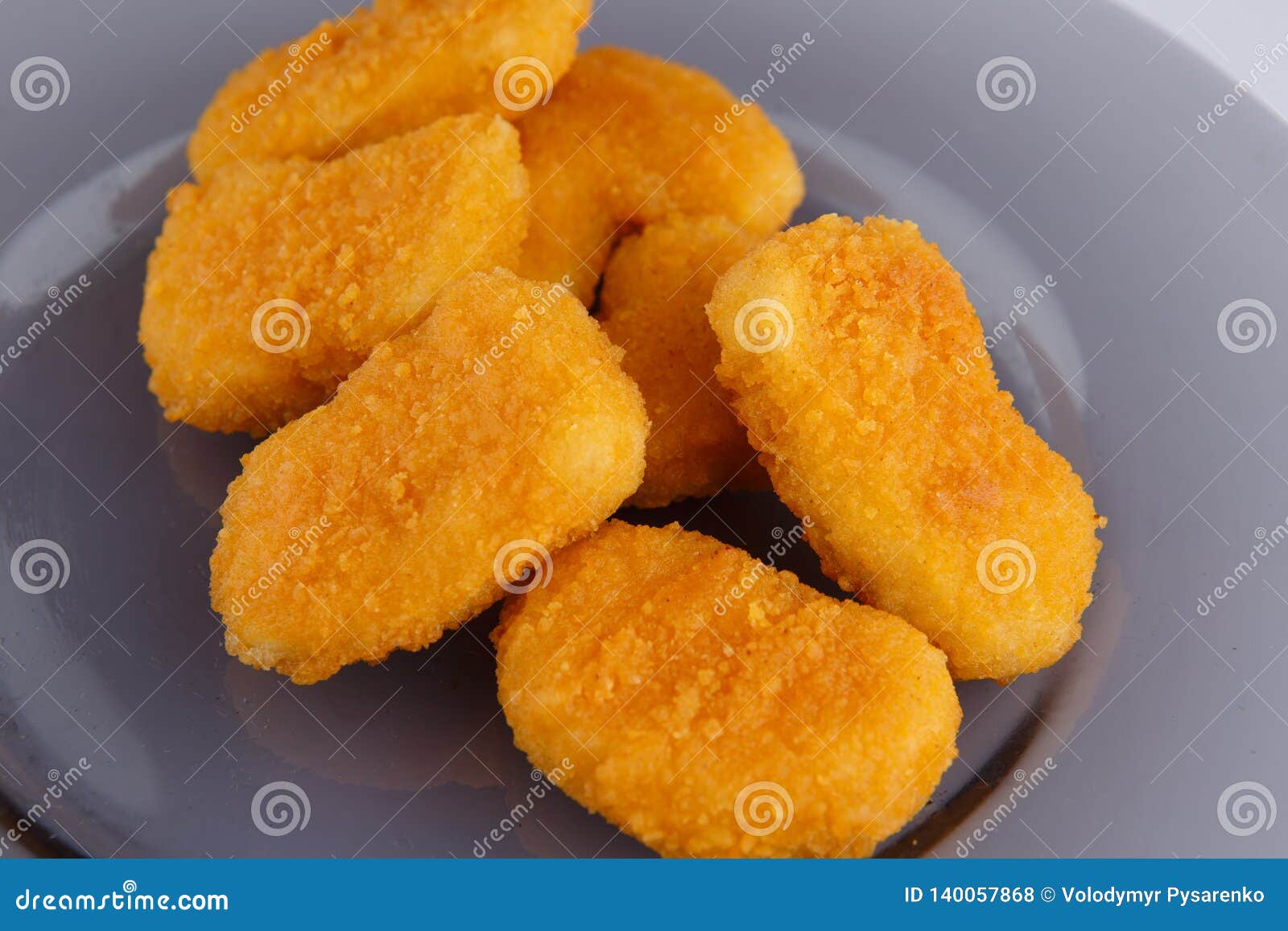 Chicken Nuggets with Cheese on a Glass Plate Stock Photo - Image of ...