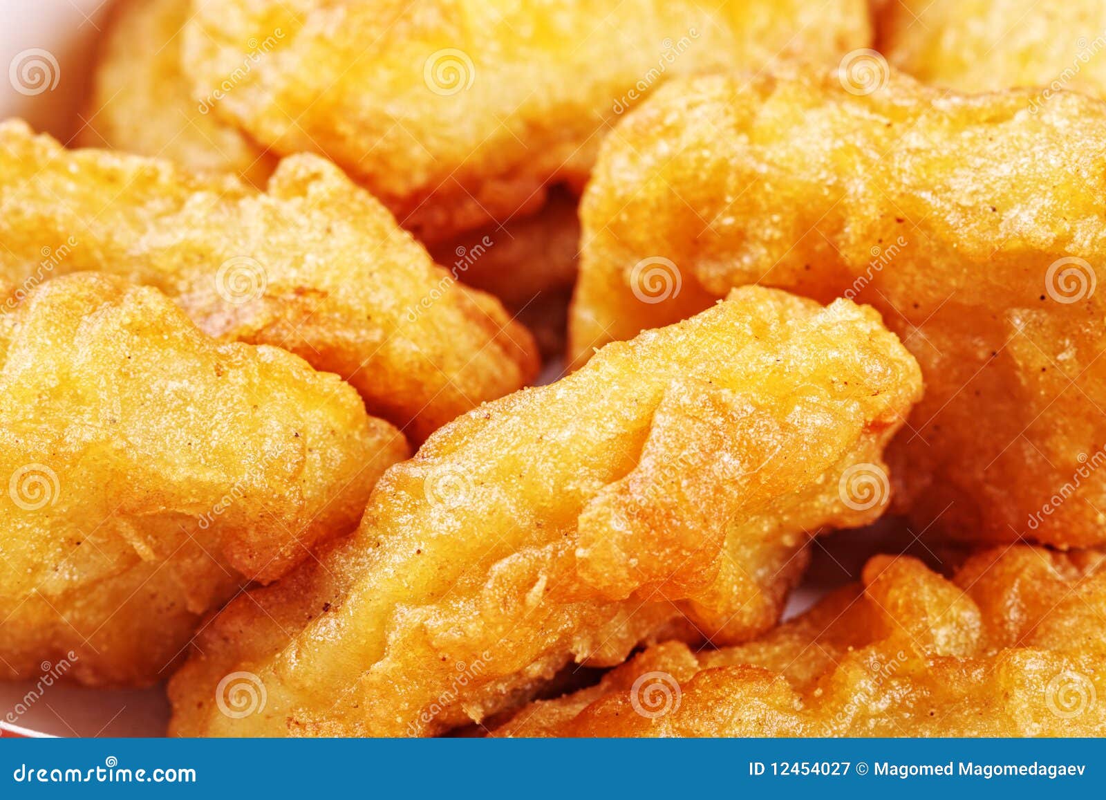 Chicken nuggets closeup stock image. Image of focus, meat - 12454027