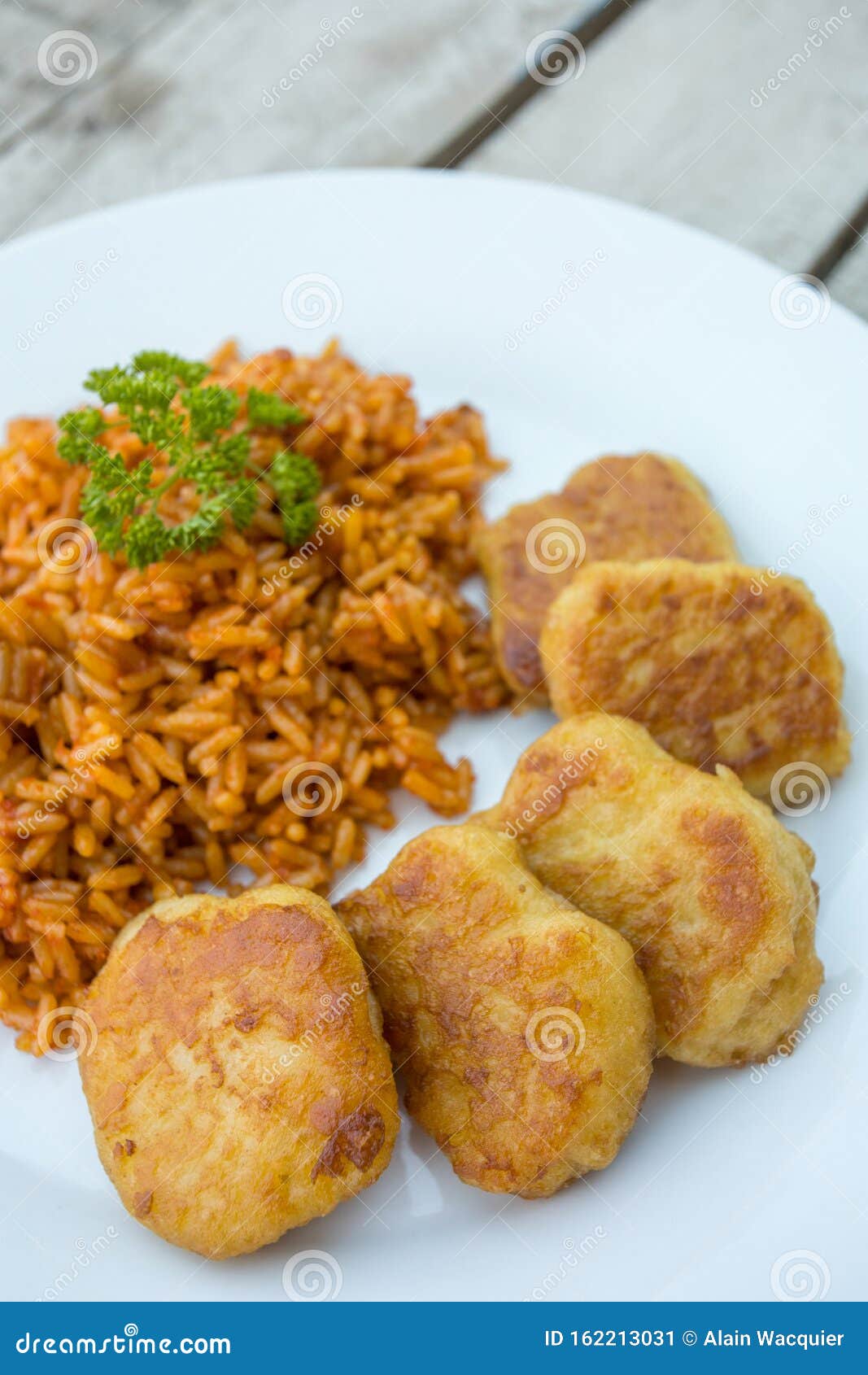 Chicken Nuggets and Rice with Tomato Stock Image - Image of plate, meal ...