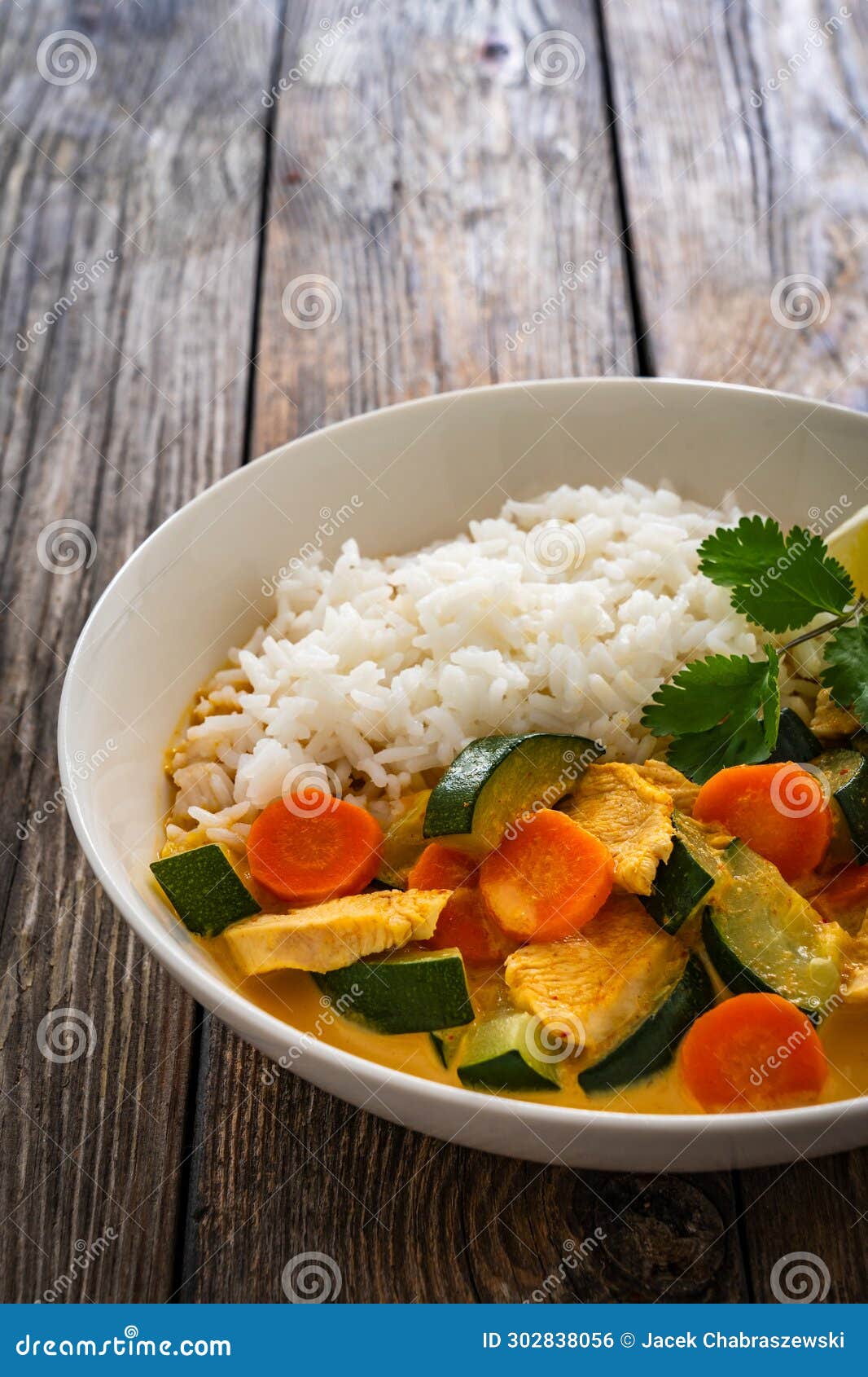 Chicken Nuggets with Rice and Vegetables on Wooden Table Stock Photo ... Chicken Nuggets with Rice and Vegetables on Wooden Table Stock Photo ...