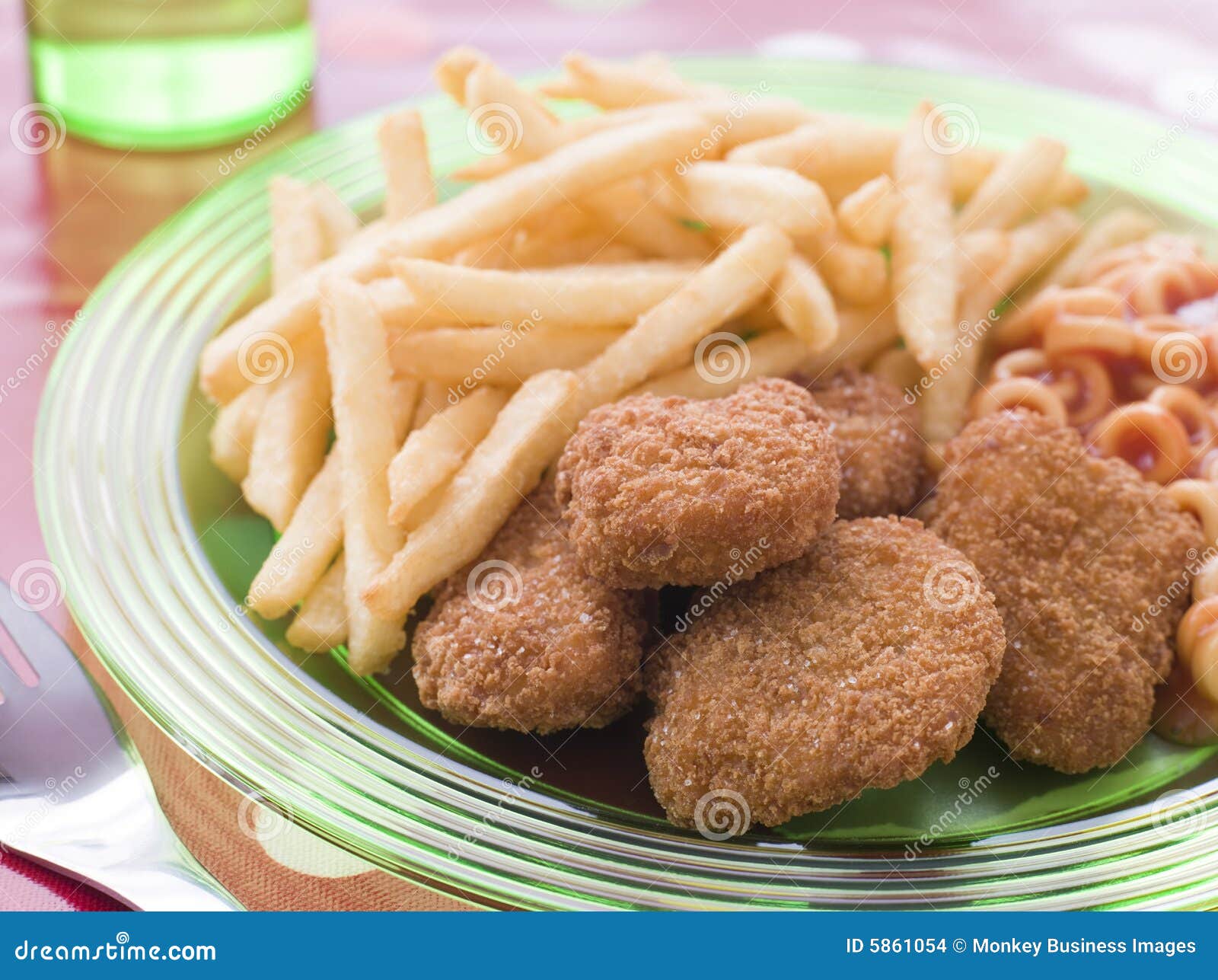 Chicken Nuggets with Spaghetti Hoops and Chips Stock Photo - Image of ...