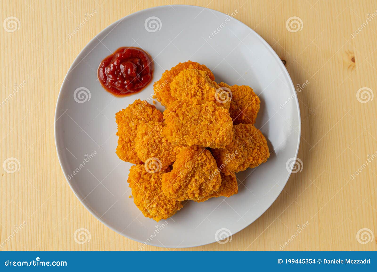 Chicken nuggets stock photo. Image of savoury, materials - 199445354