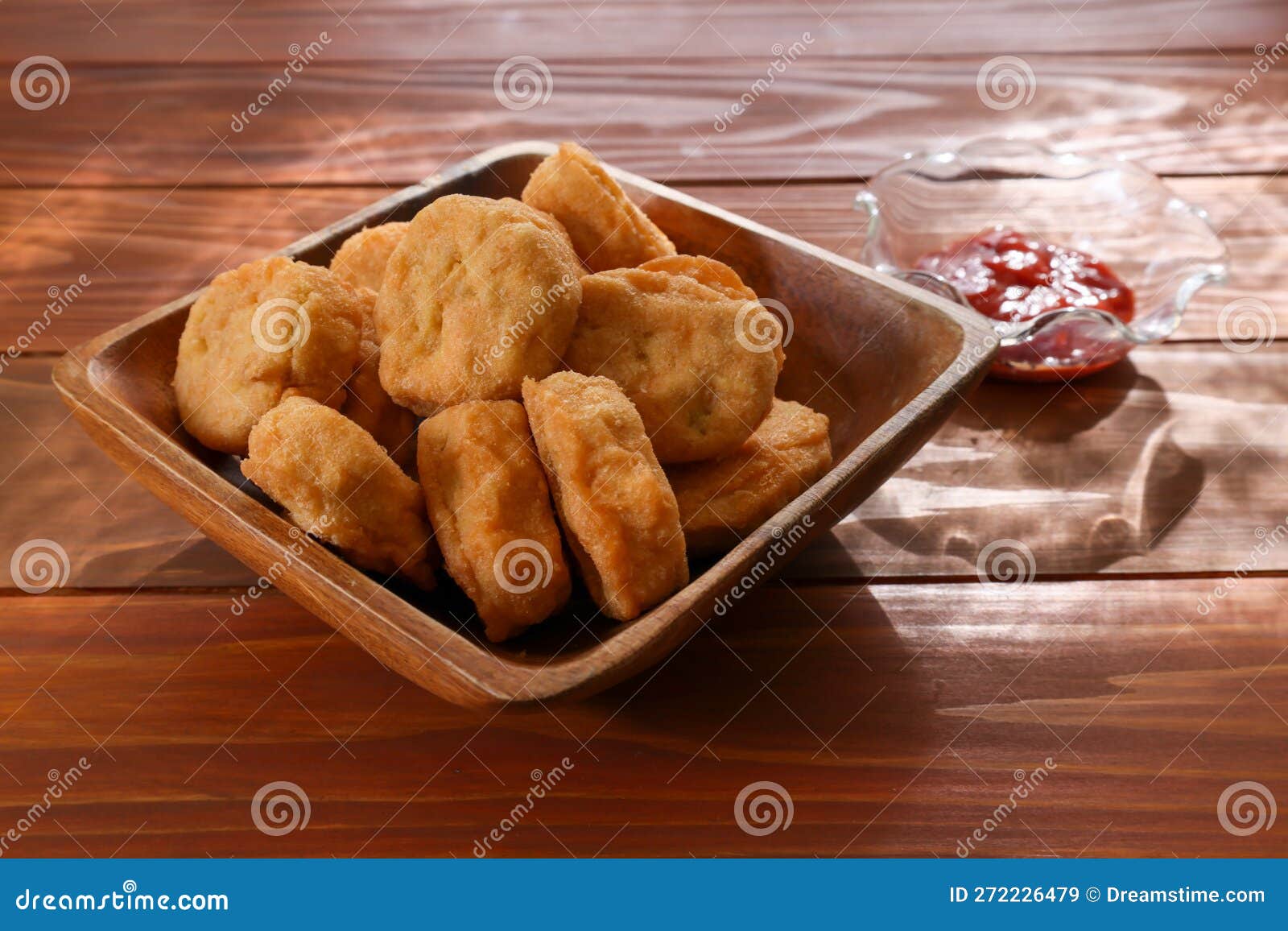 Chicken Nuggets in a Wooden Bowl on a Wooden Table Stock Image - Image ...