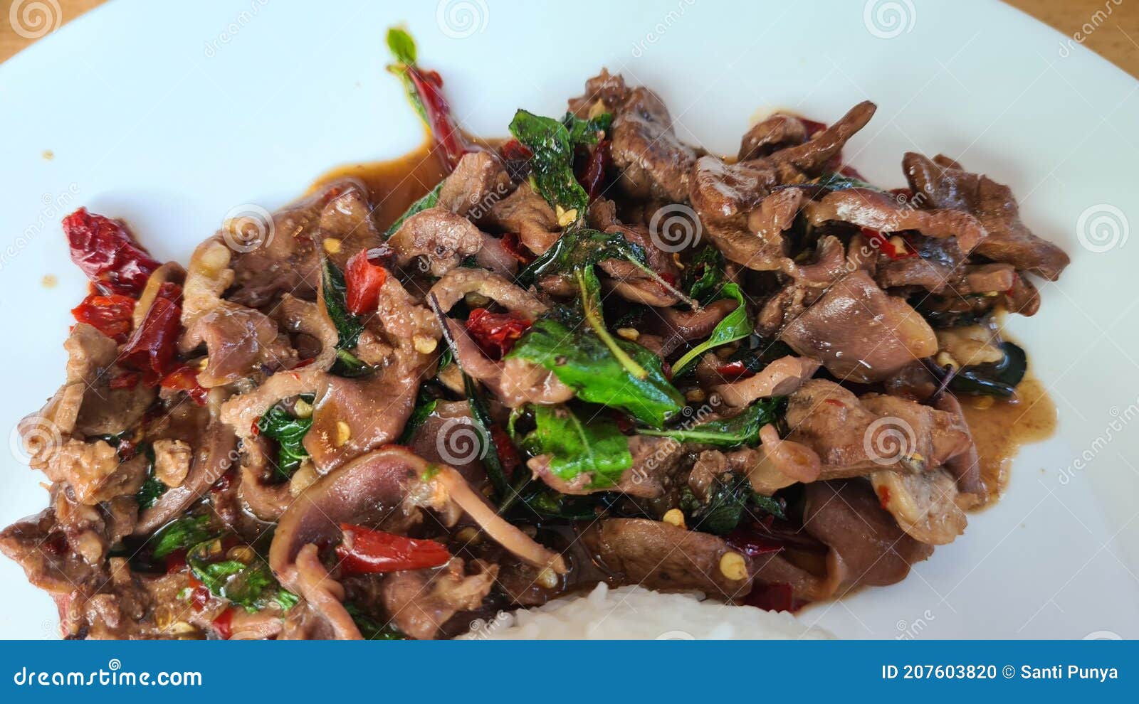 Chicken Organs with Basil Paste on Rice Stock Photo - Image of seafood ...