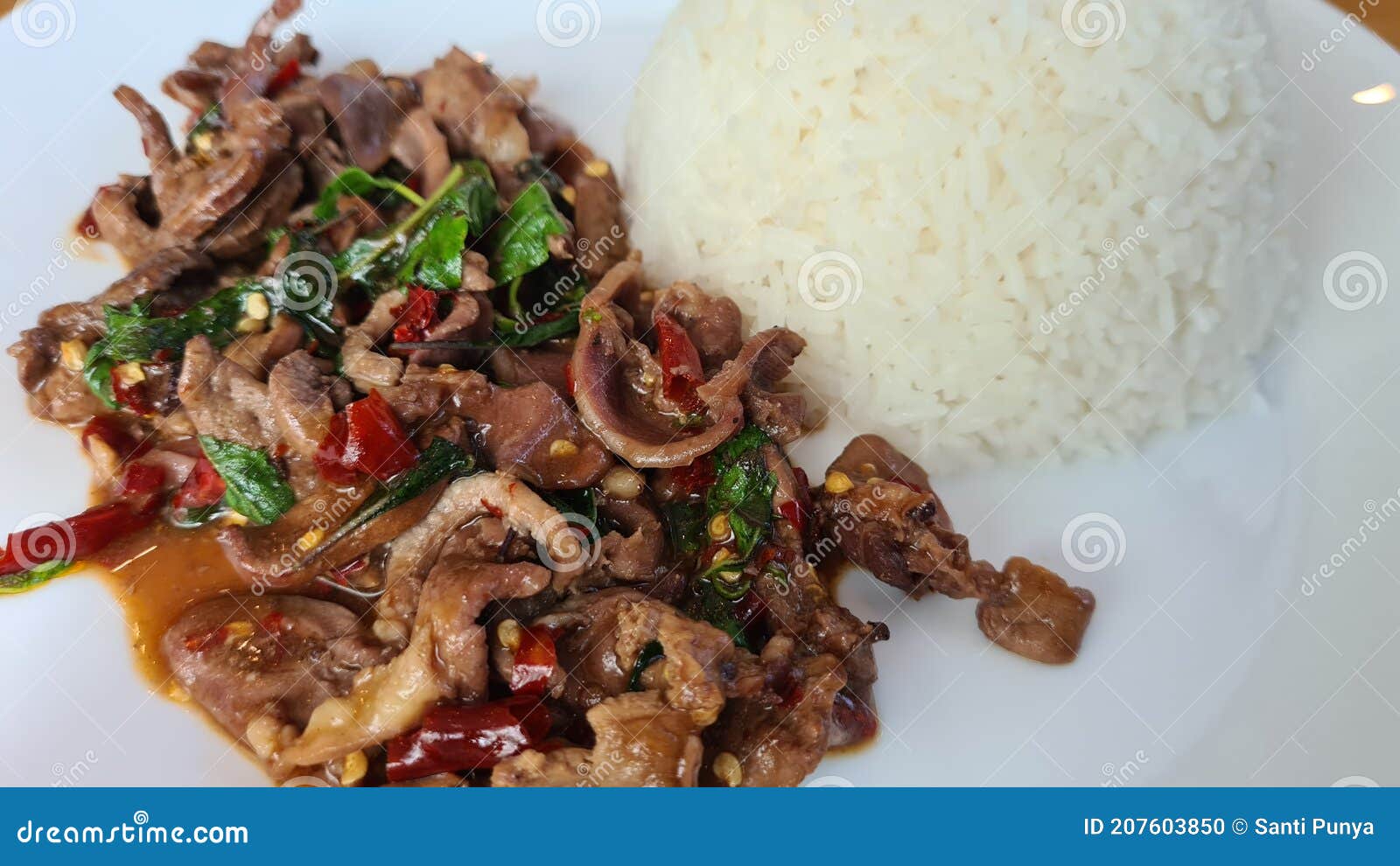 Chicken Organs with Basil Paste on Rice Stock Photo - Image of salad ...