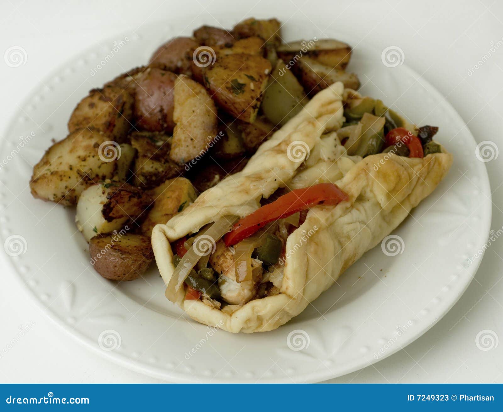 Chicken Philly Pitta Bread with Roast Potatoes Stock Image - Image of ...