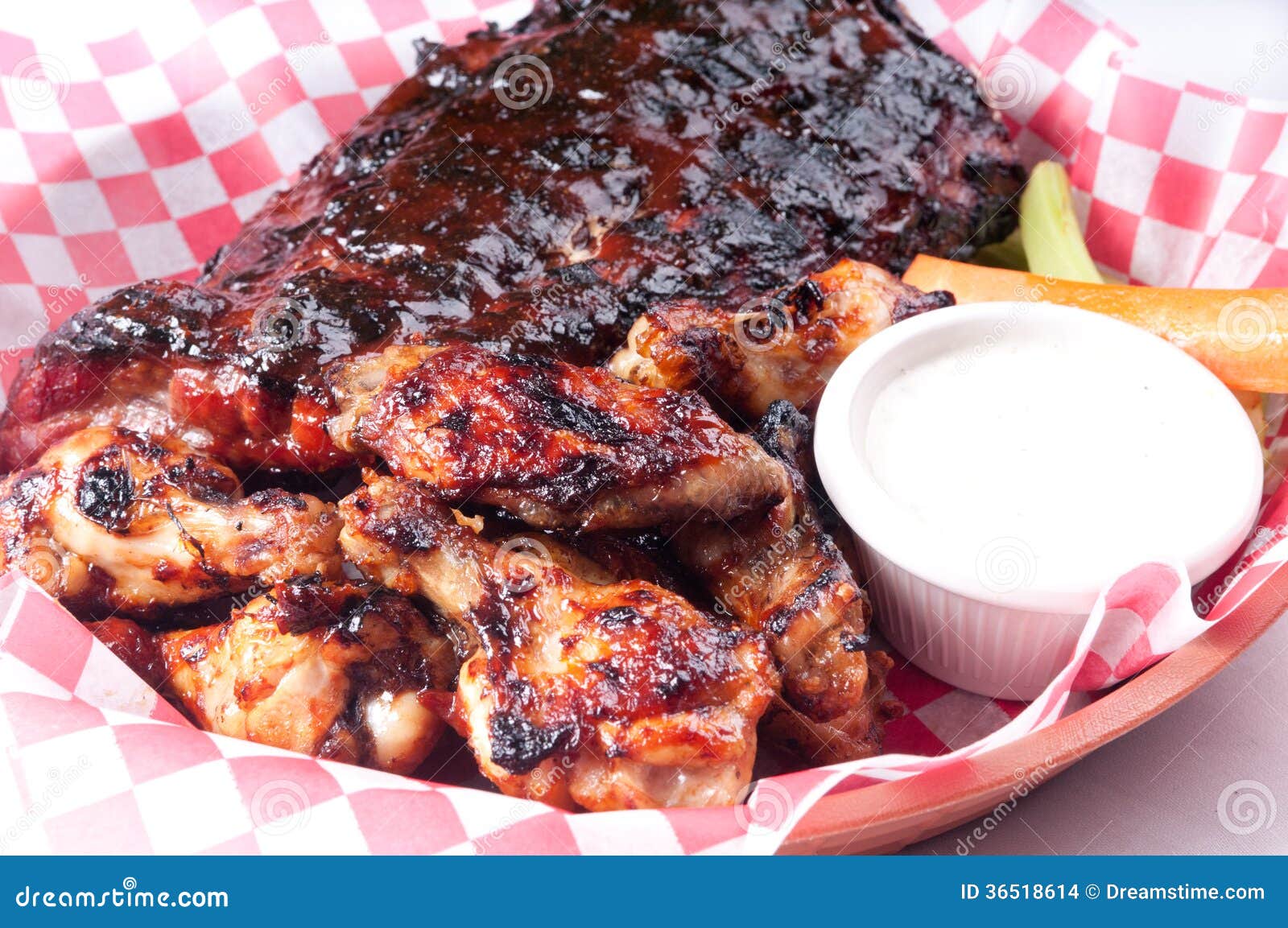 Chicken and rib dinner stock photo. Image of dinner, sauce - 36518614