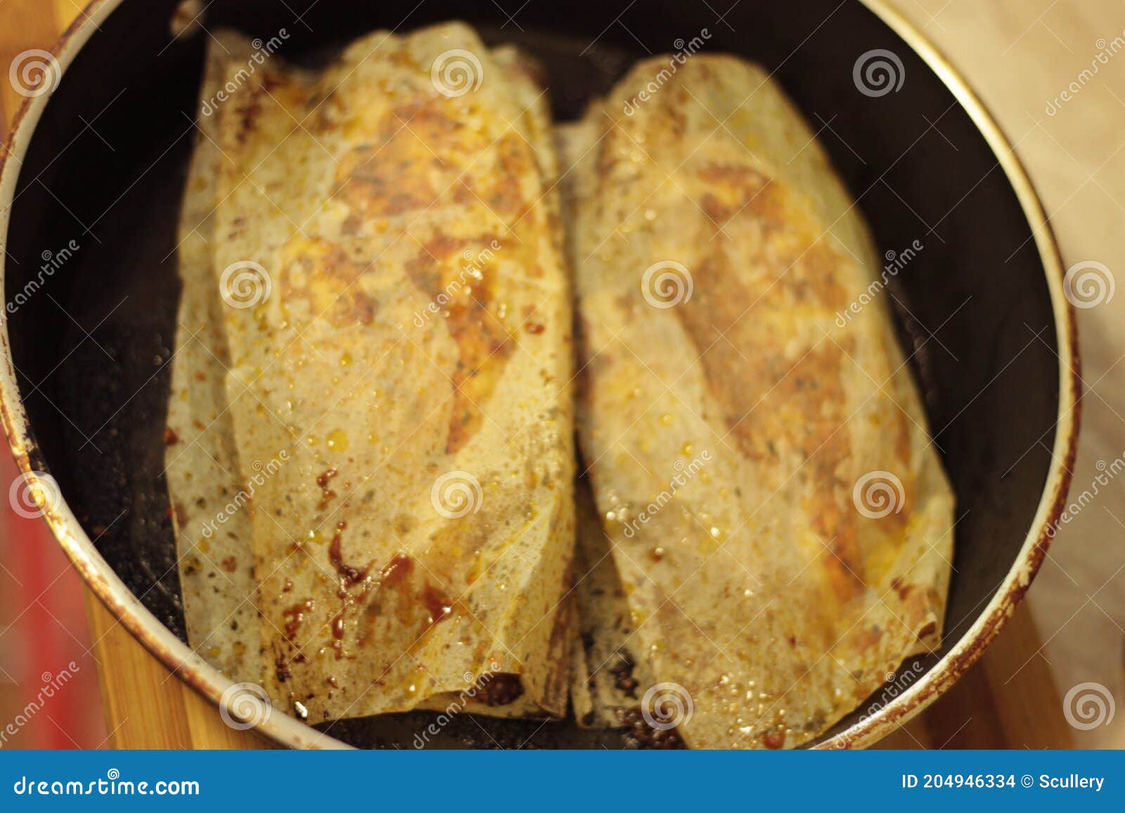 Chicken Roasted in Paper on Black Pan Stock Photo - Image of cooked ...