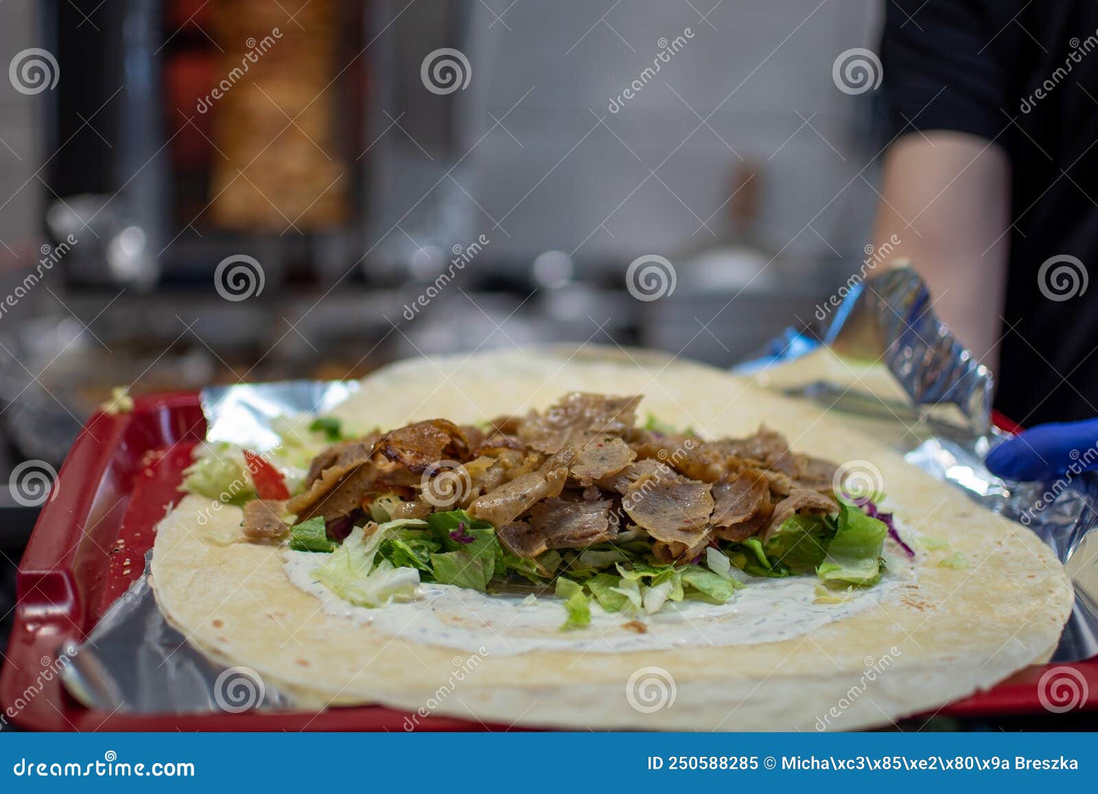 Making a Kebab in a Restaurant Chicken Salad in Rollo Stock Image ...
