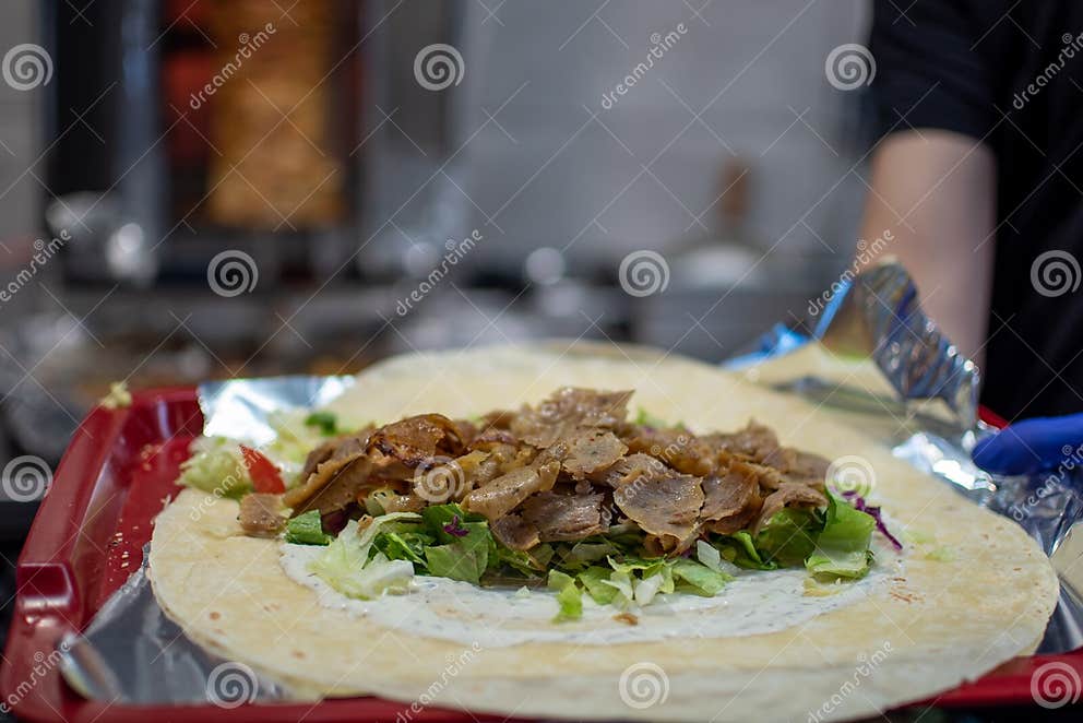 Making a Kebab in a Restaurant Chicken Salad in Rollo Stock Image ...