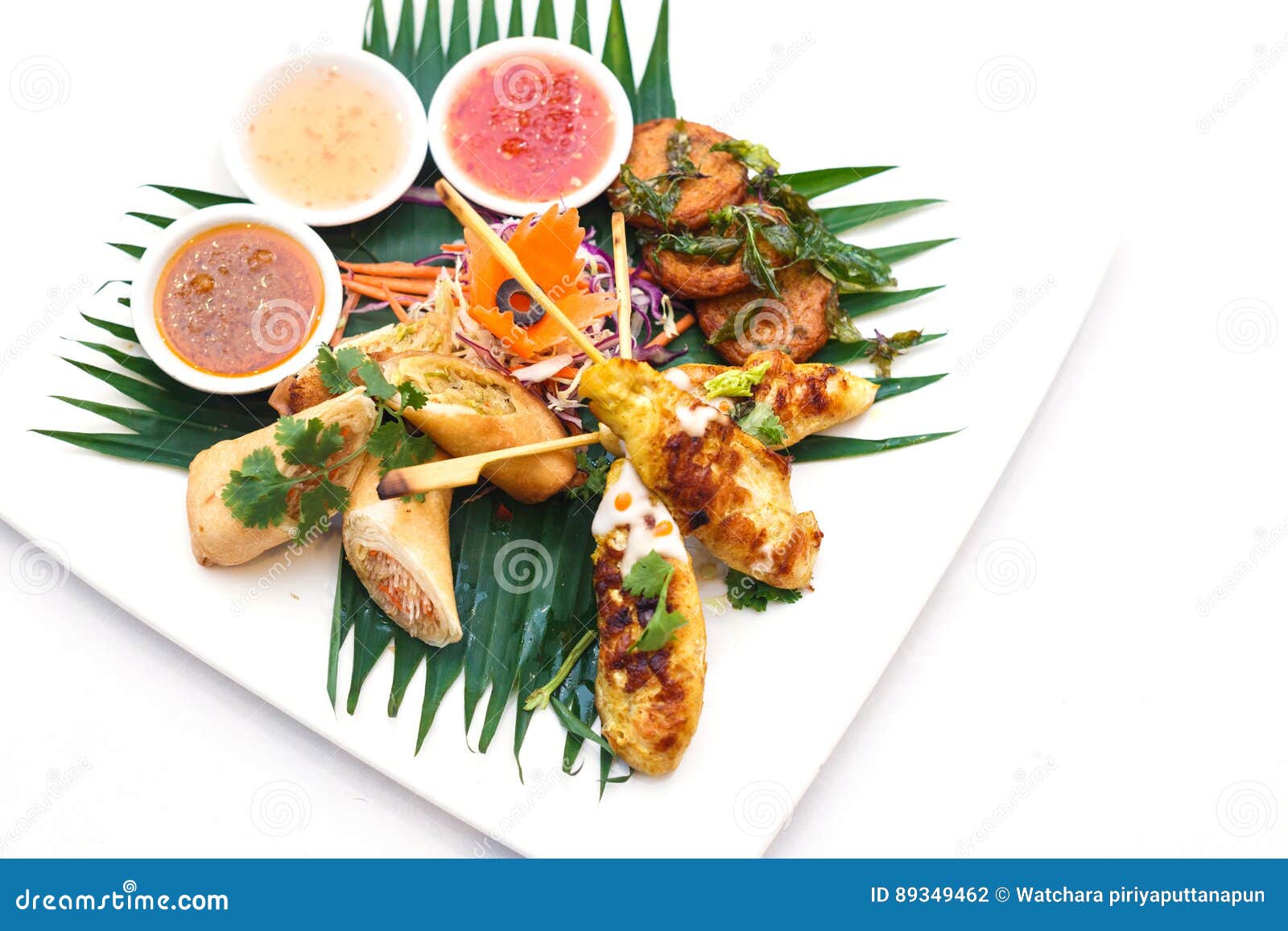 Chicken Satay and Fried Fish-paste Balls and Spring Rolls Stock Photo ...