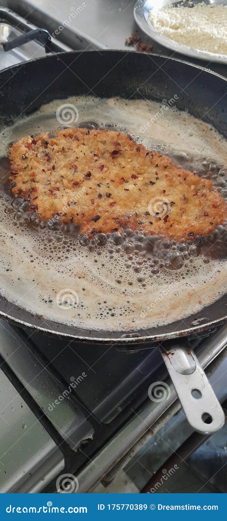 Chicken Schnitzel frying stock image. Image of chicken - 175770389